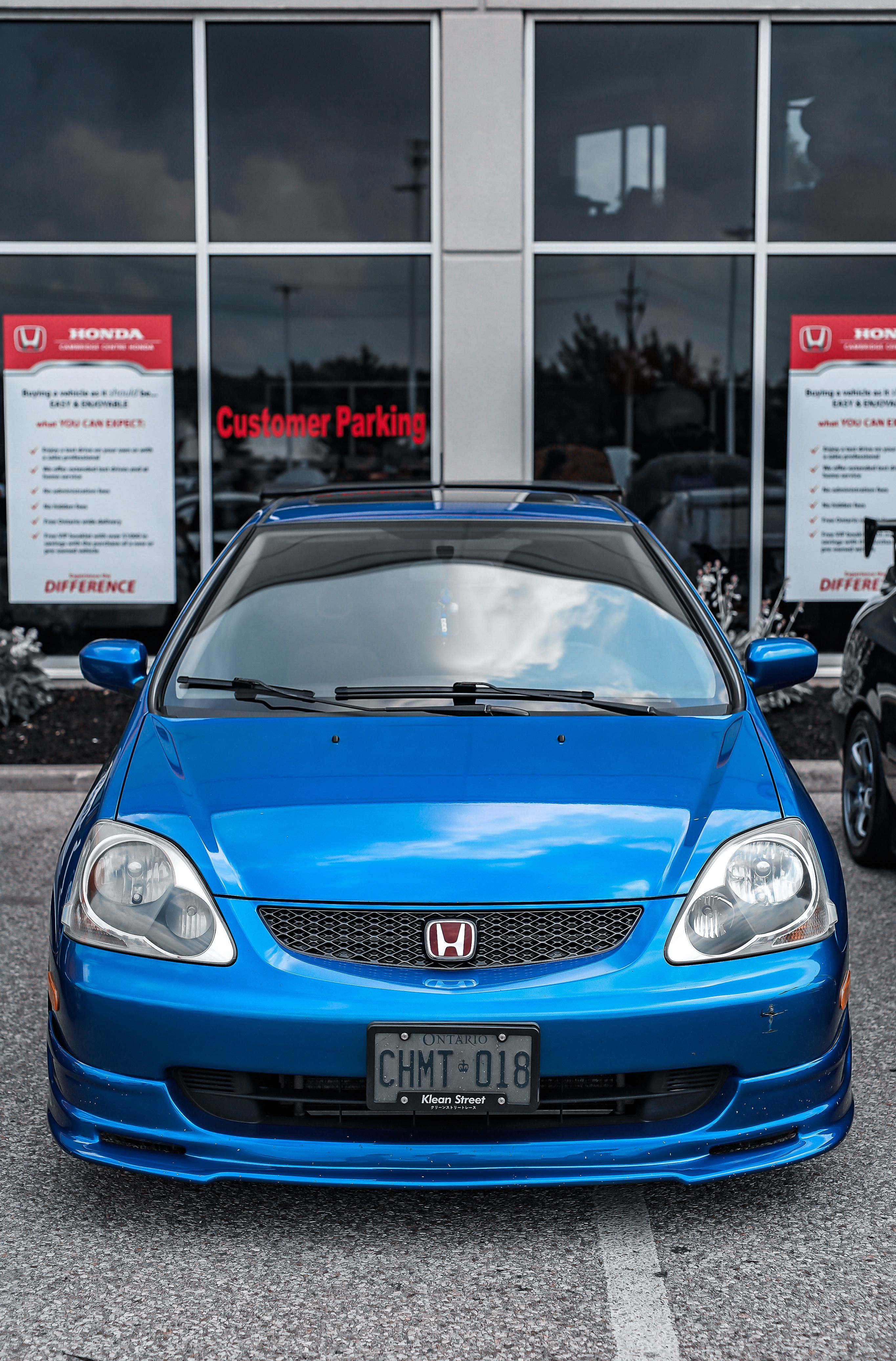 Blue Honda Civic on Parking Lot of Car Dealer · Free Stock Photo