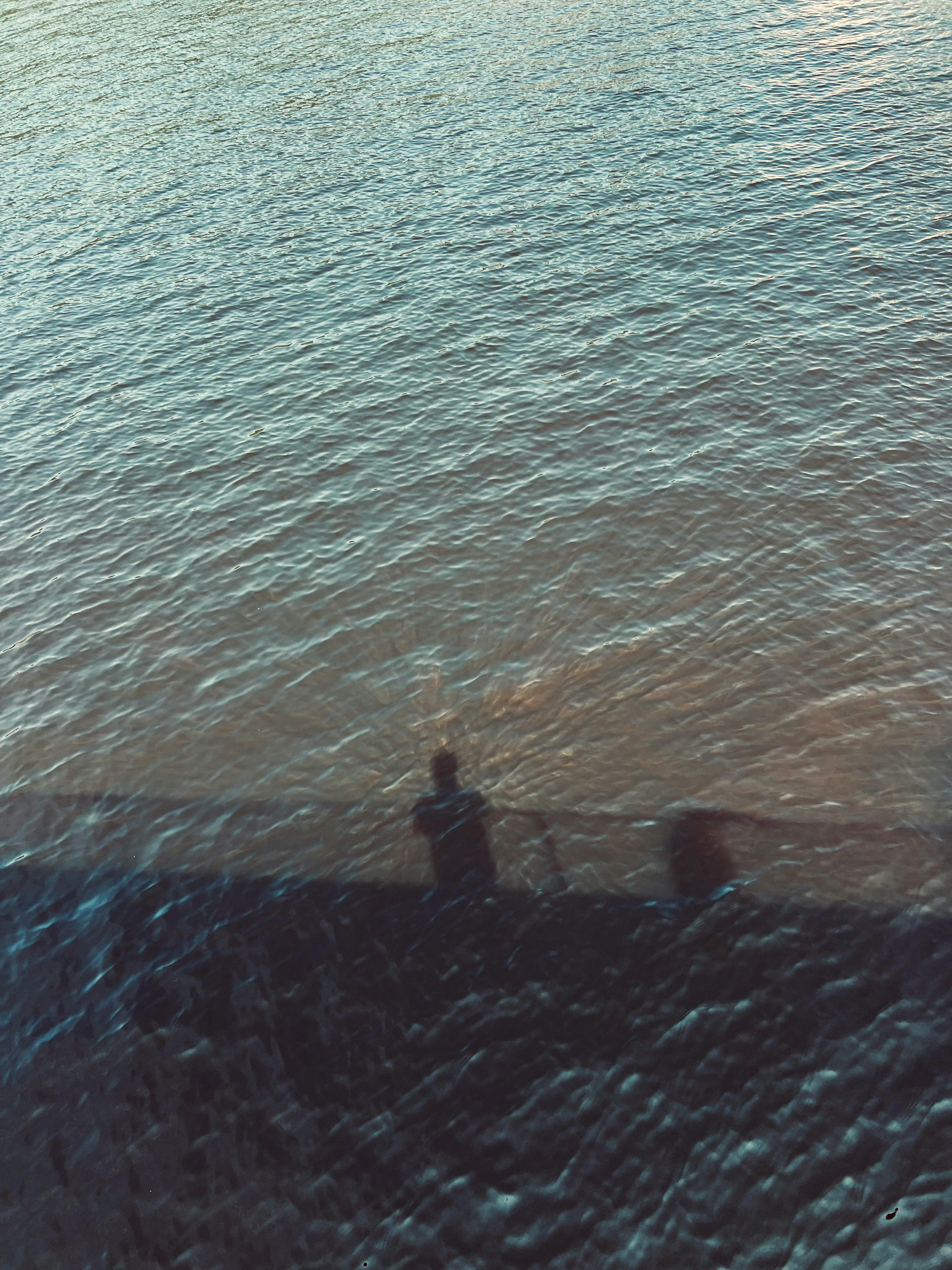 Standing Person Shadow on Water · Free Stock Photo