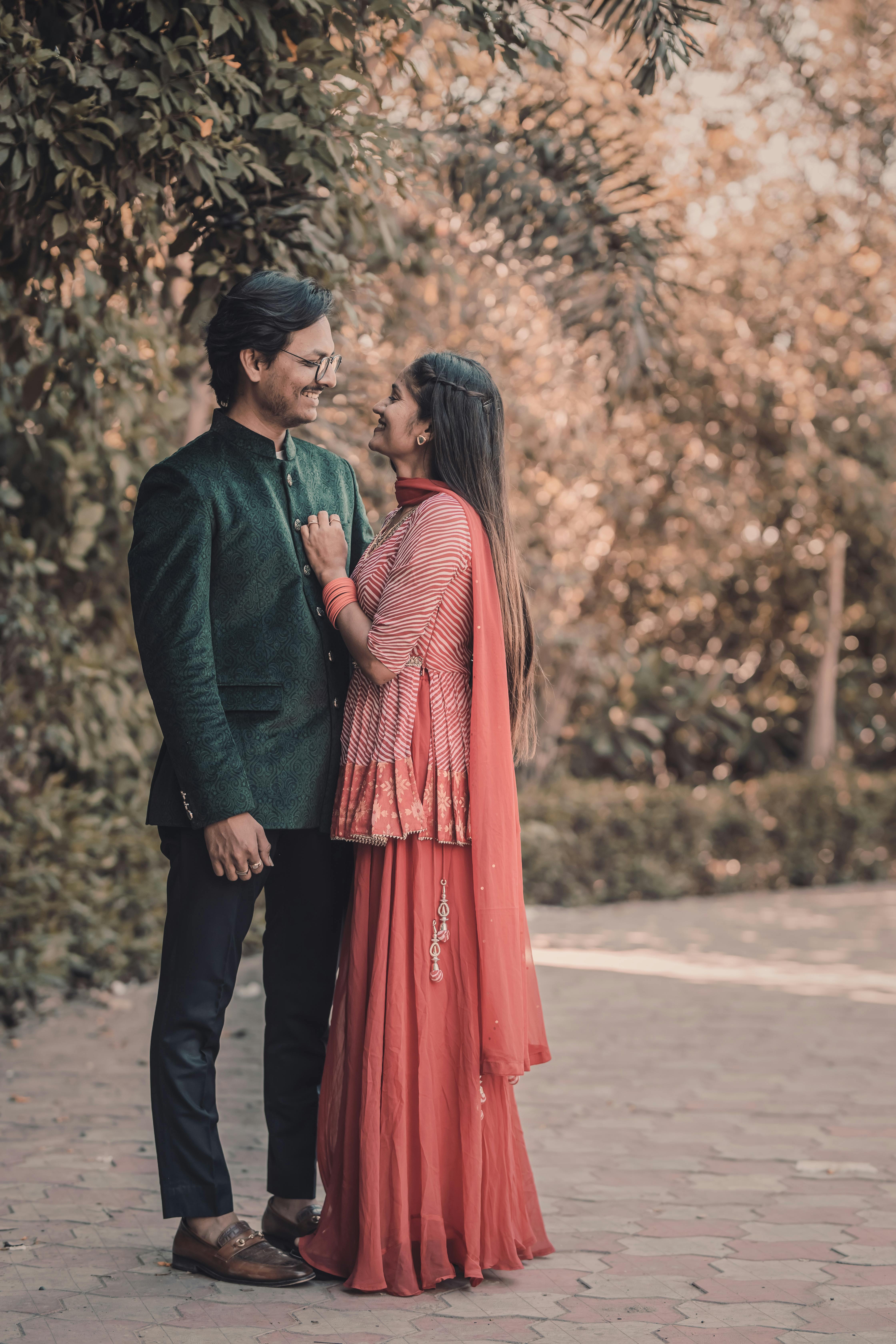 Young Couple in Traditional Indian Clothing Standing and Holding Hands ...