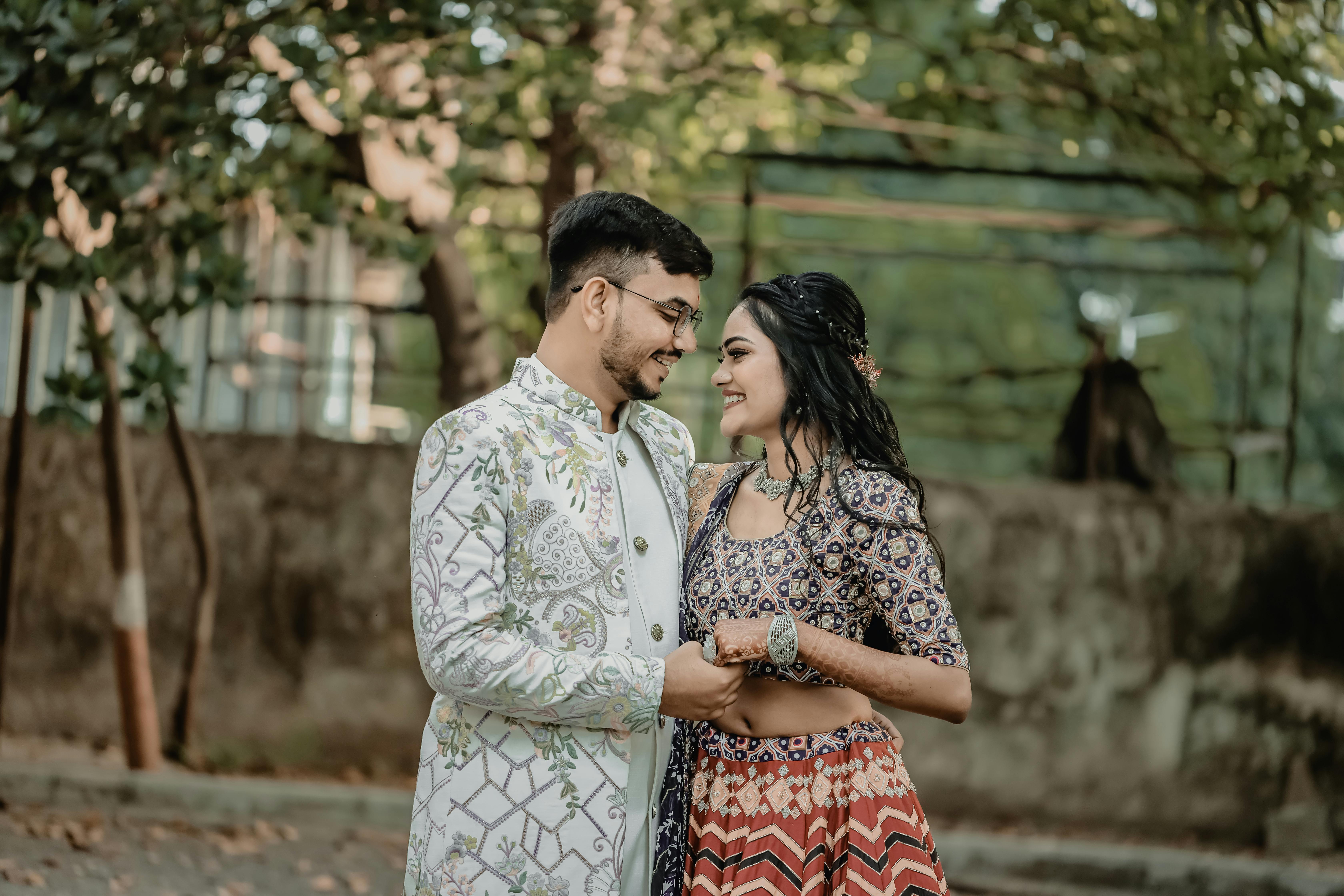 Newlywed Indian Couple in Traditional Clothing · Free Stock Photo