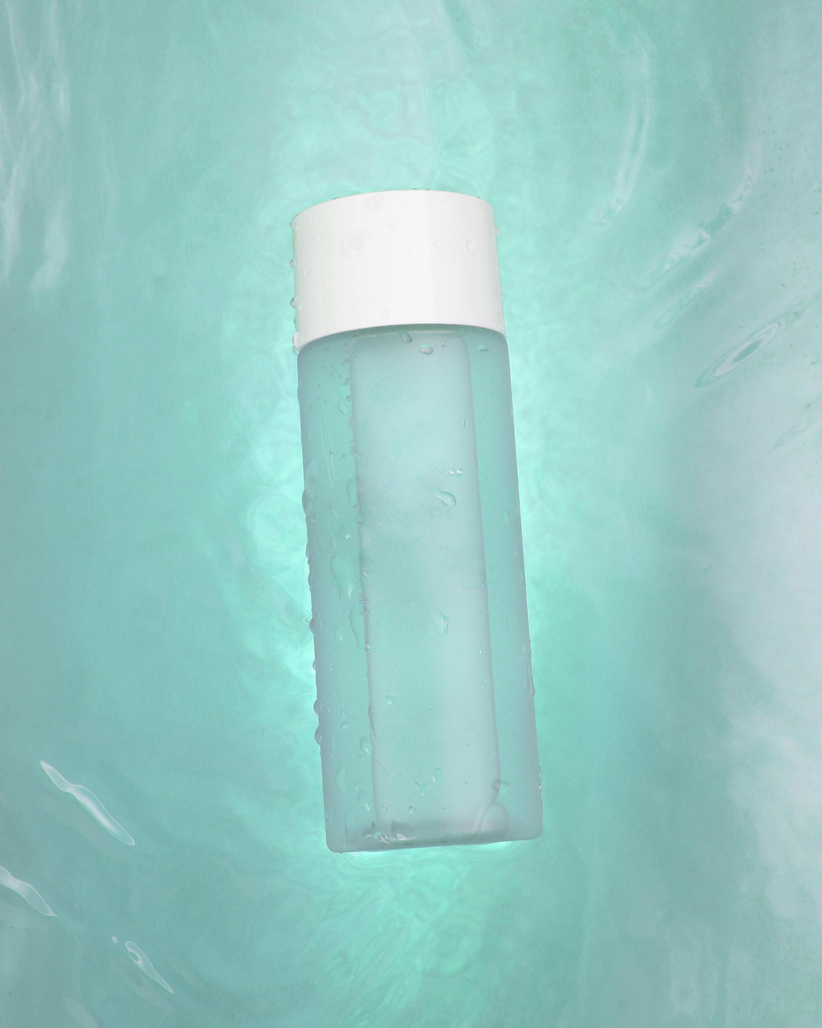Bottle Floating on Water · Free Stock Photo