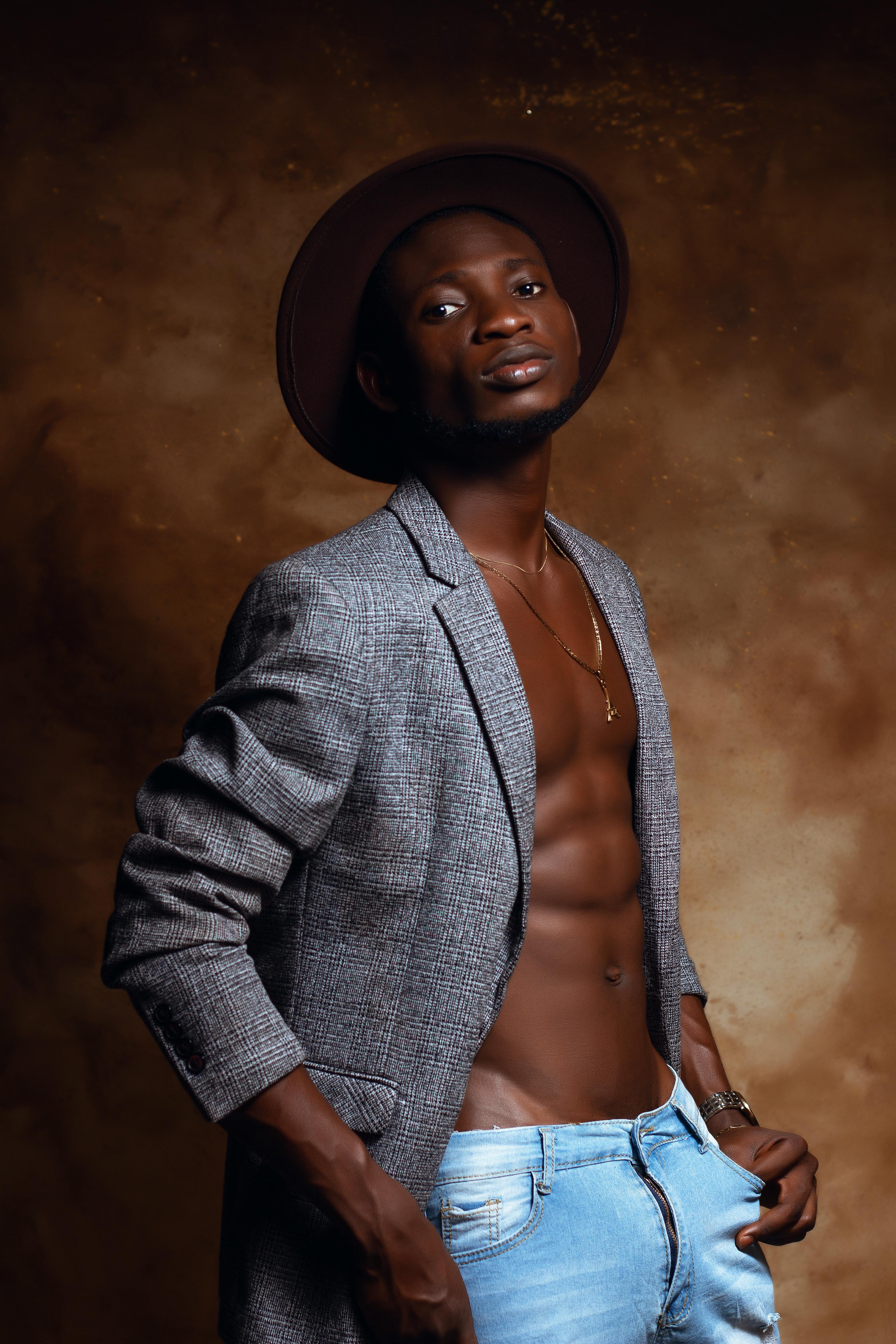 Muscular Man in Jacket and Black Hat · Free Stock Photo