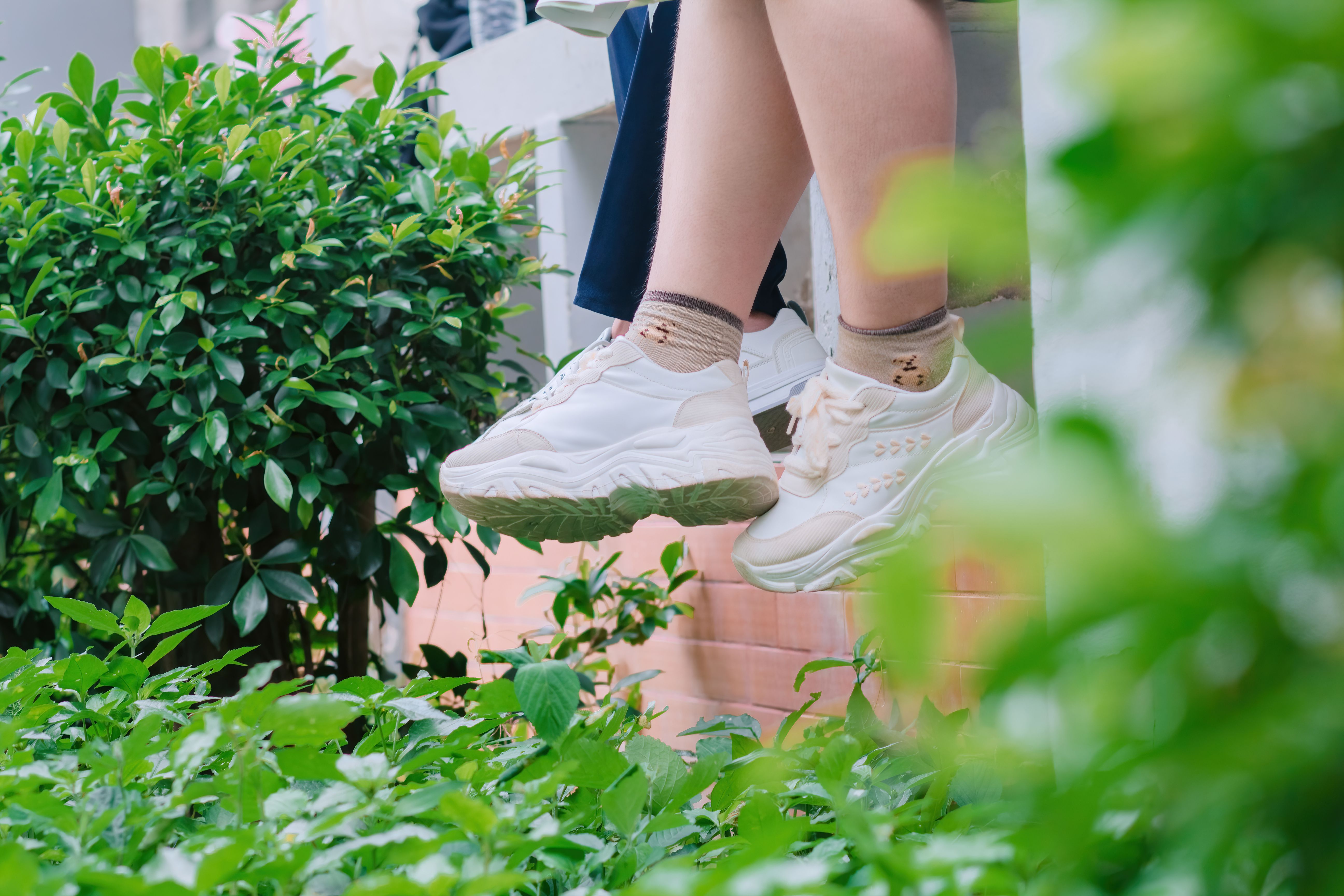 Person Wearing Black Vans Old Skool Sneakers Facing Body of Water ...