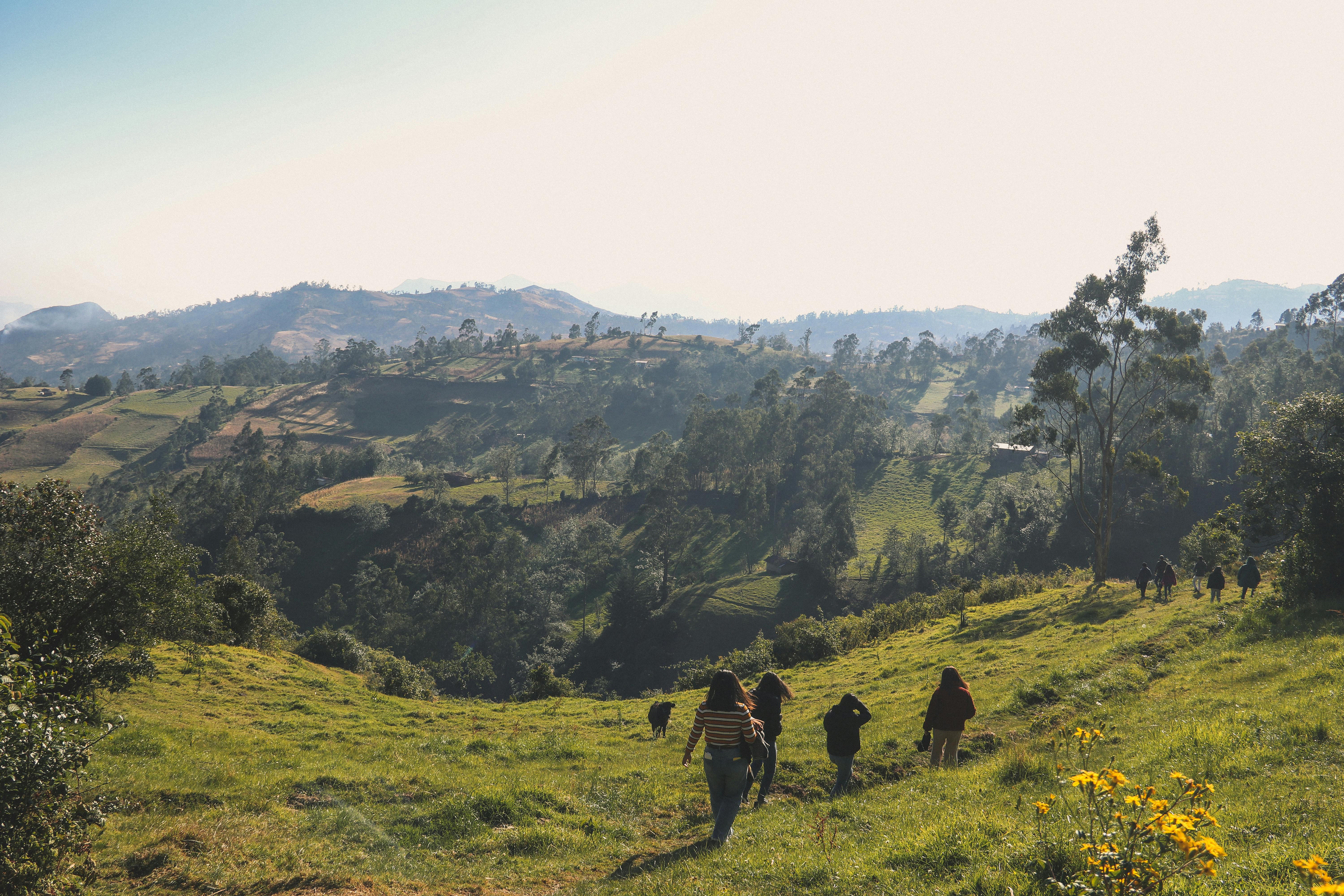 People on Hill in Countryside · Free Stock Photo