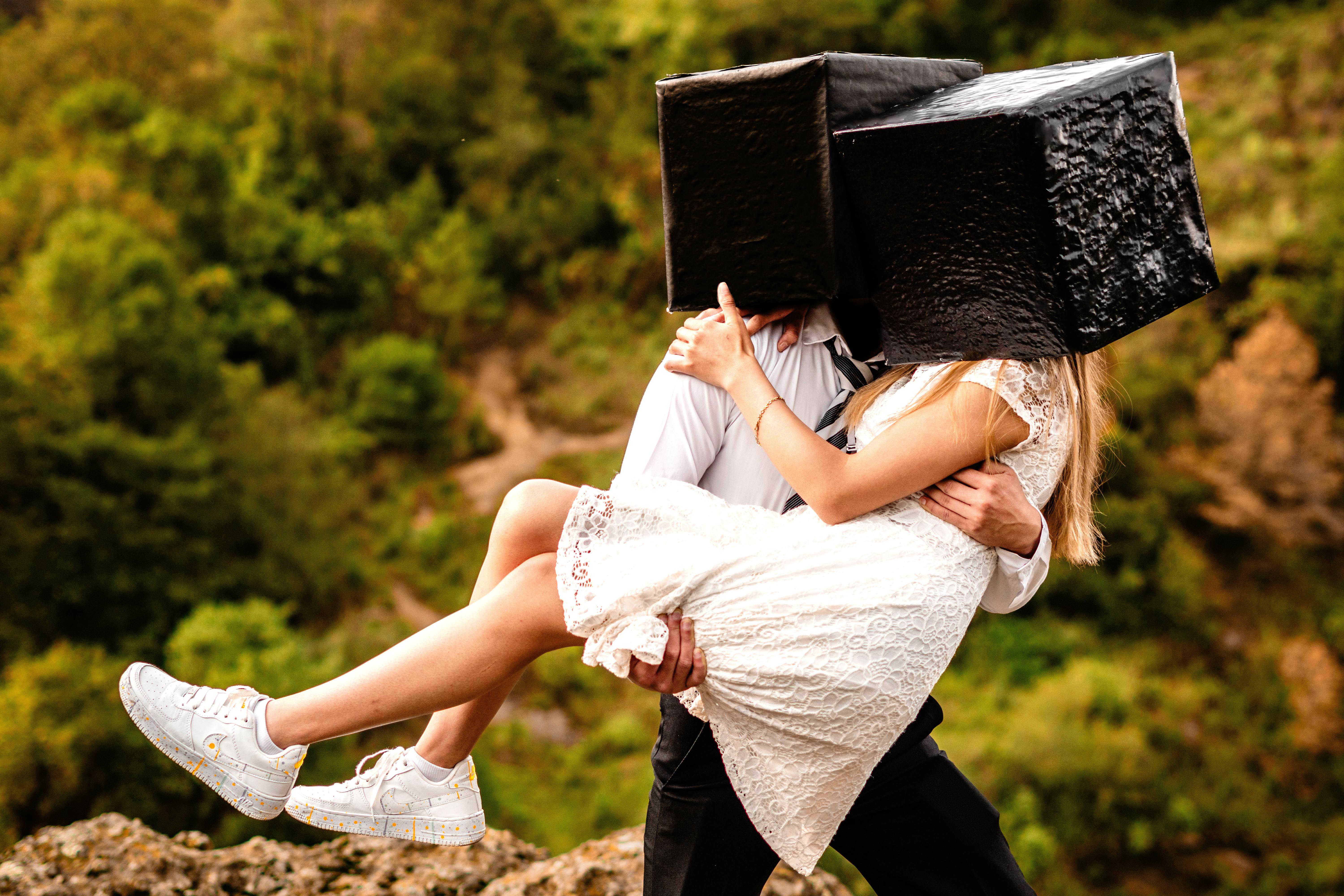 Anonymous Couple Embracing in Park · Free Stock Photo