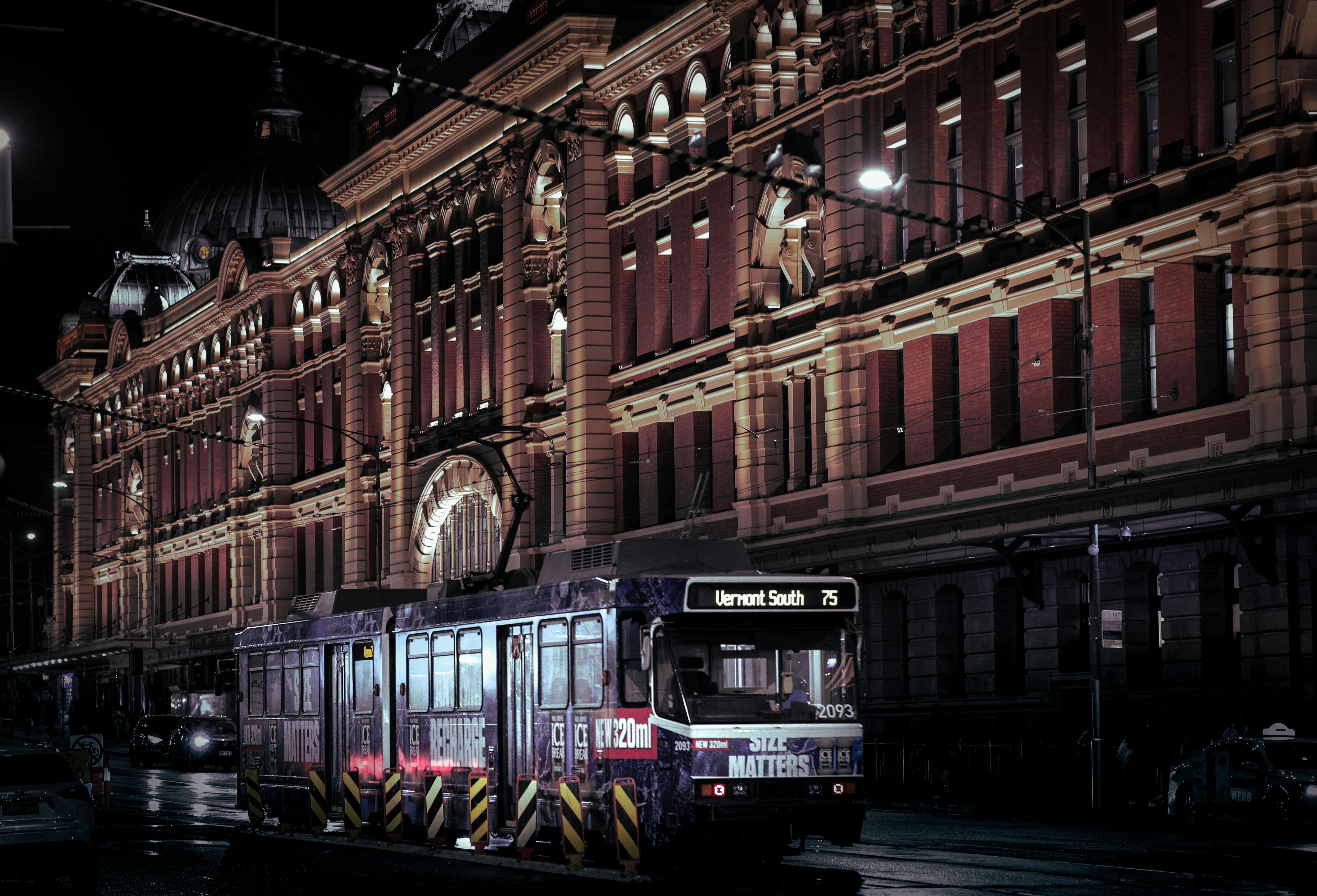 A Tram in a City at Night · Free Stock Photo
