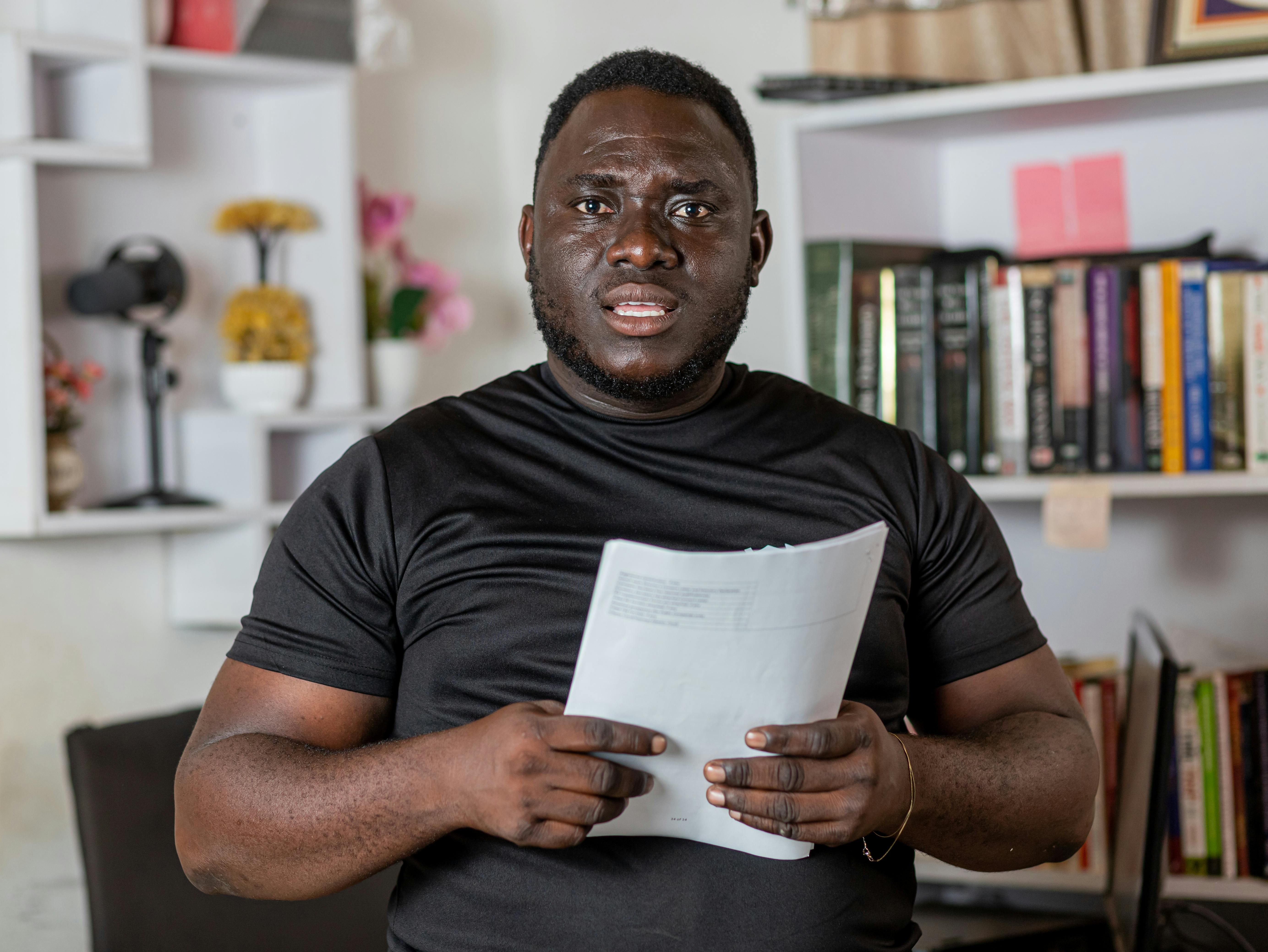 African Squinting To Read Very Small Text On Kaptop Photos, Download ...