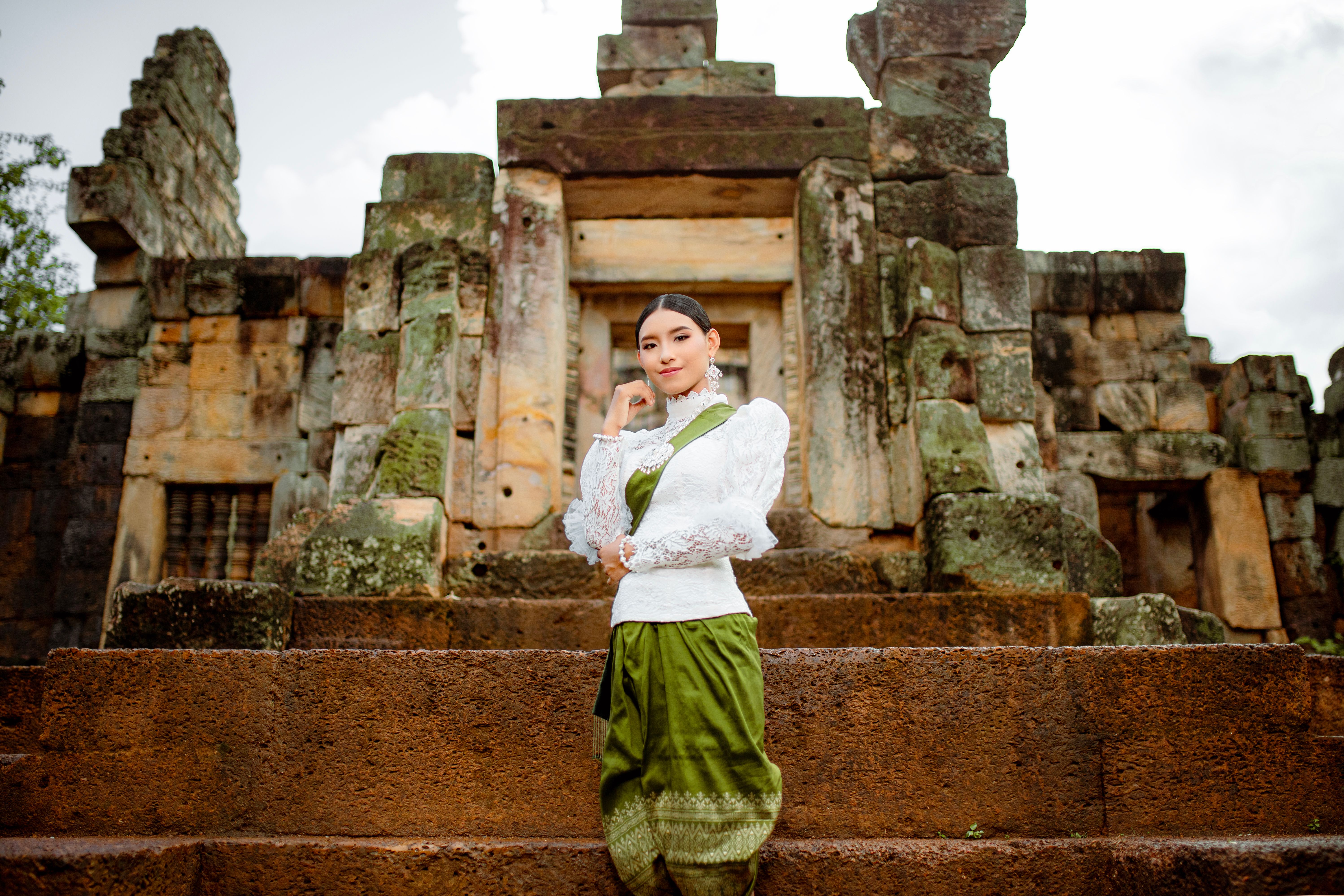 Woman in Traditional Clothing Standing in front of a Temple · Free ...