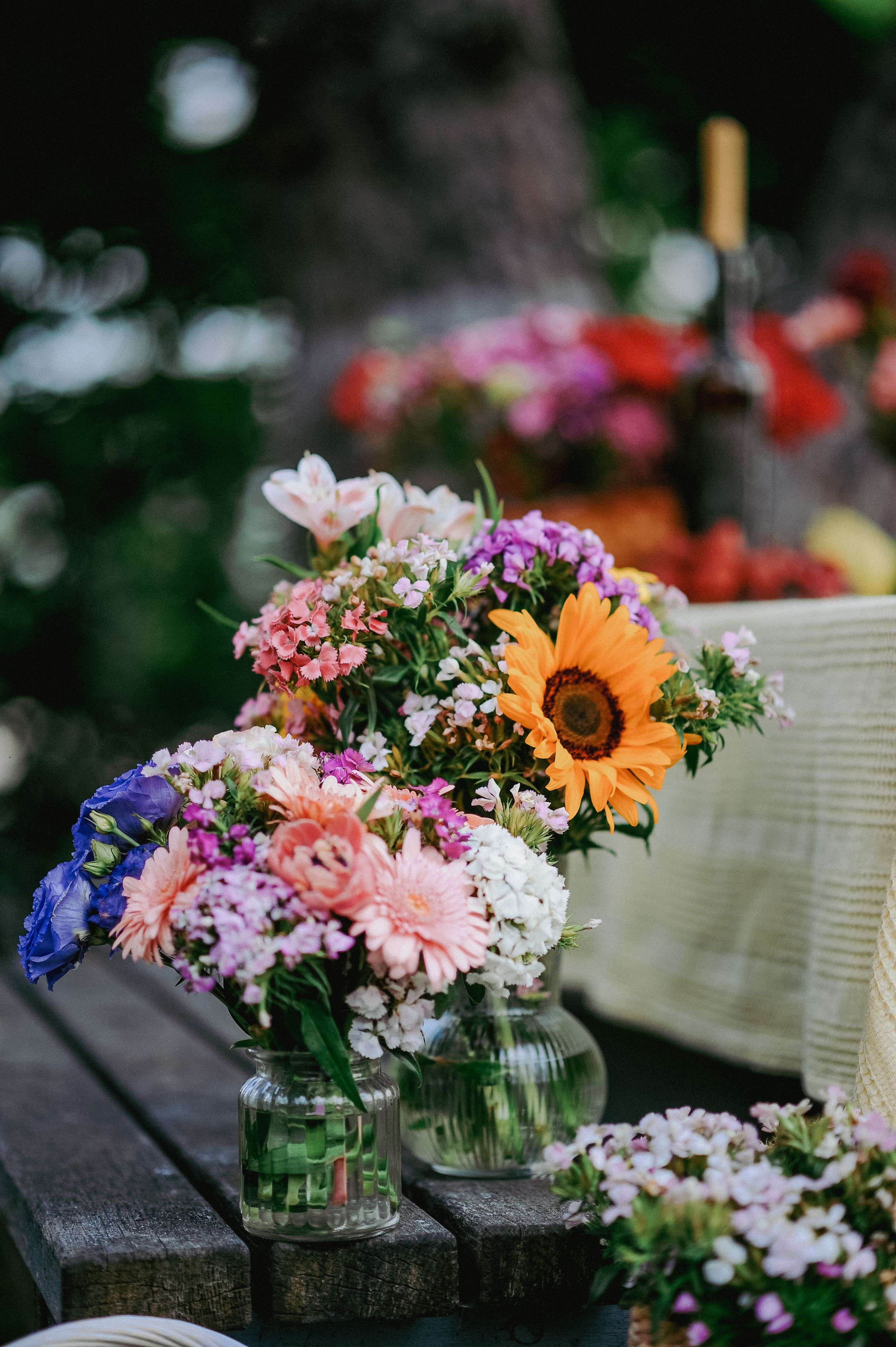 Colorful Flowers on the Table in the Garden · Free Stock Photo