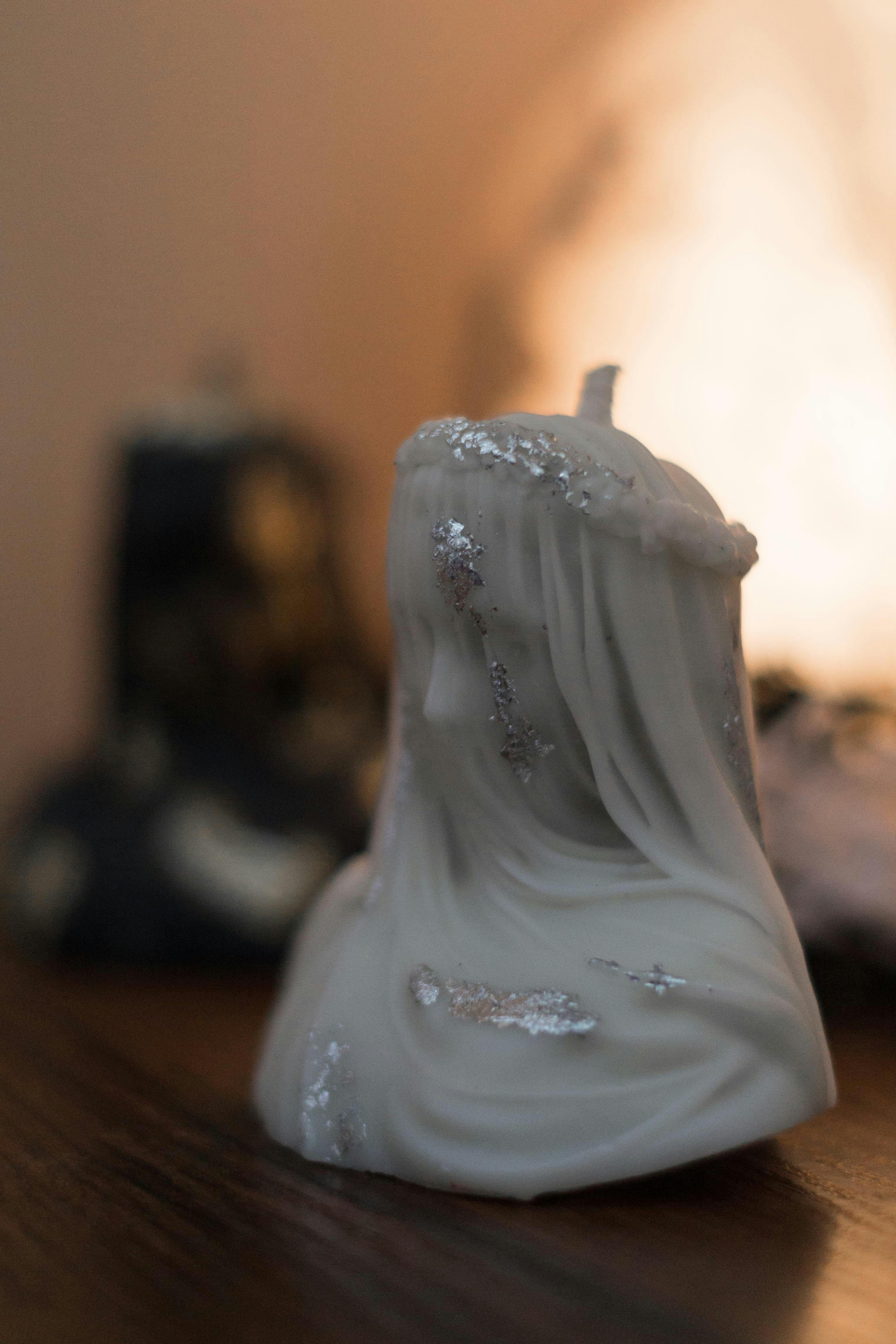 Lid of a Round Box with Embossed Sun and Zodiac Signs · Free Stock Photo