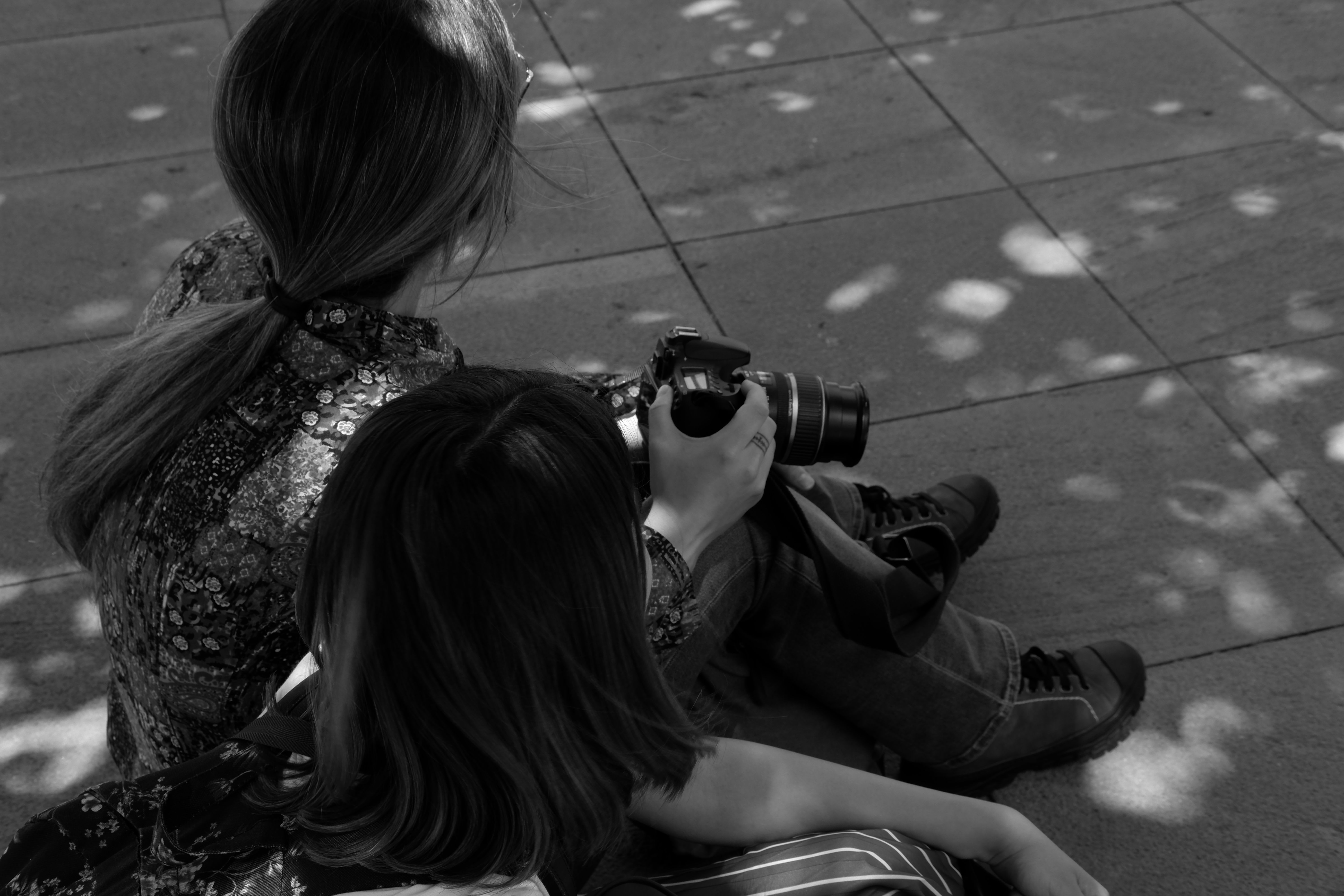 A Person Sitting with a Camera · Free Stock Photo