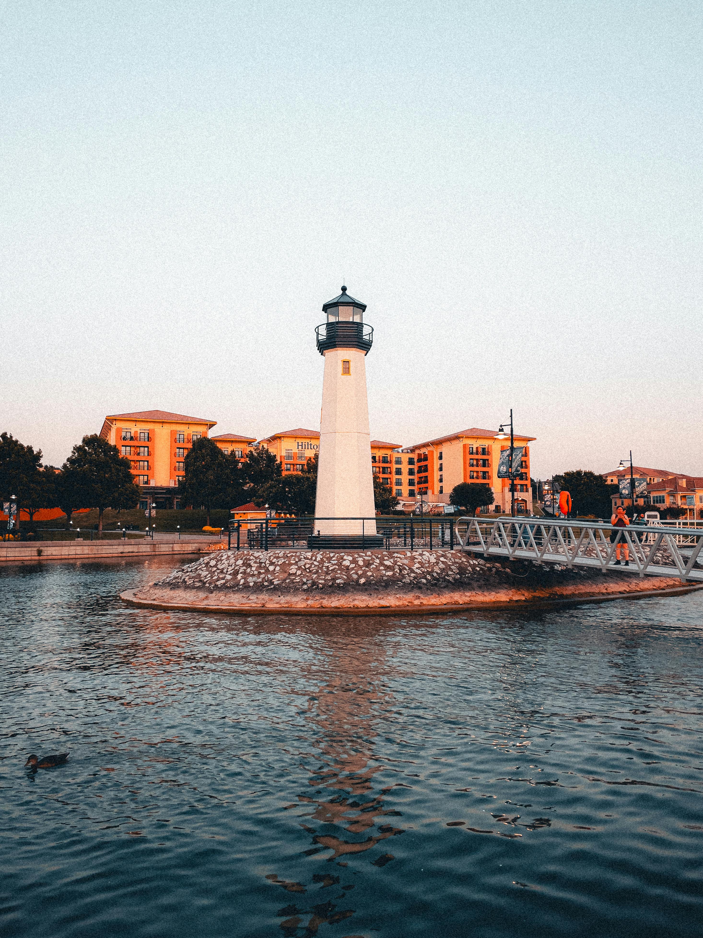 Scott Self Lighthouse with the Coast in the Background · Free Stock Photo