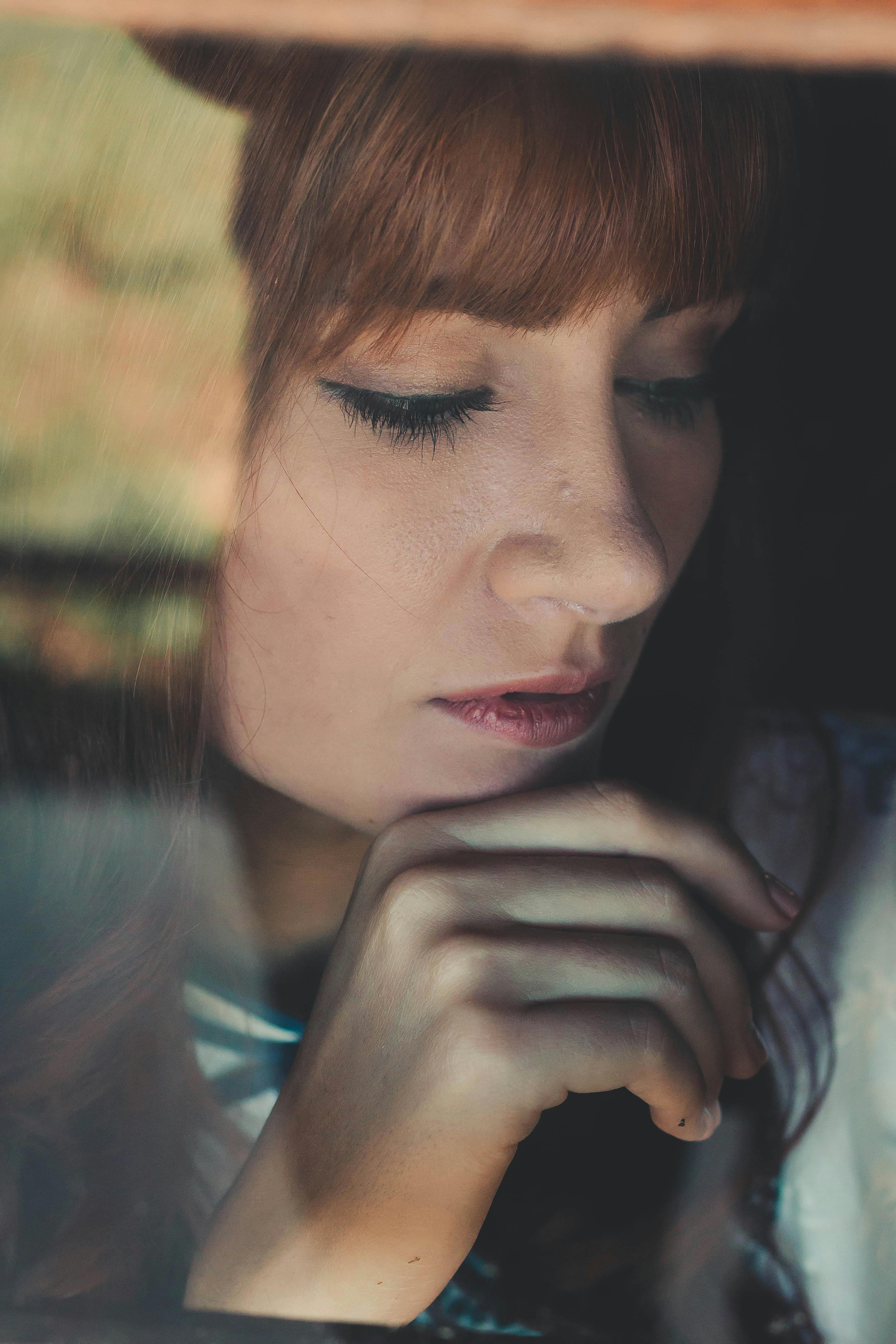 Portrait of Woman with Hand over Face · Free Stock Photo