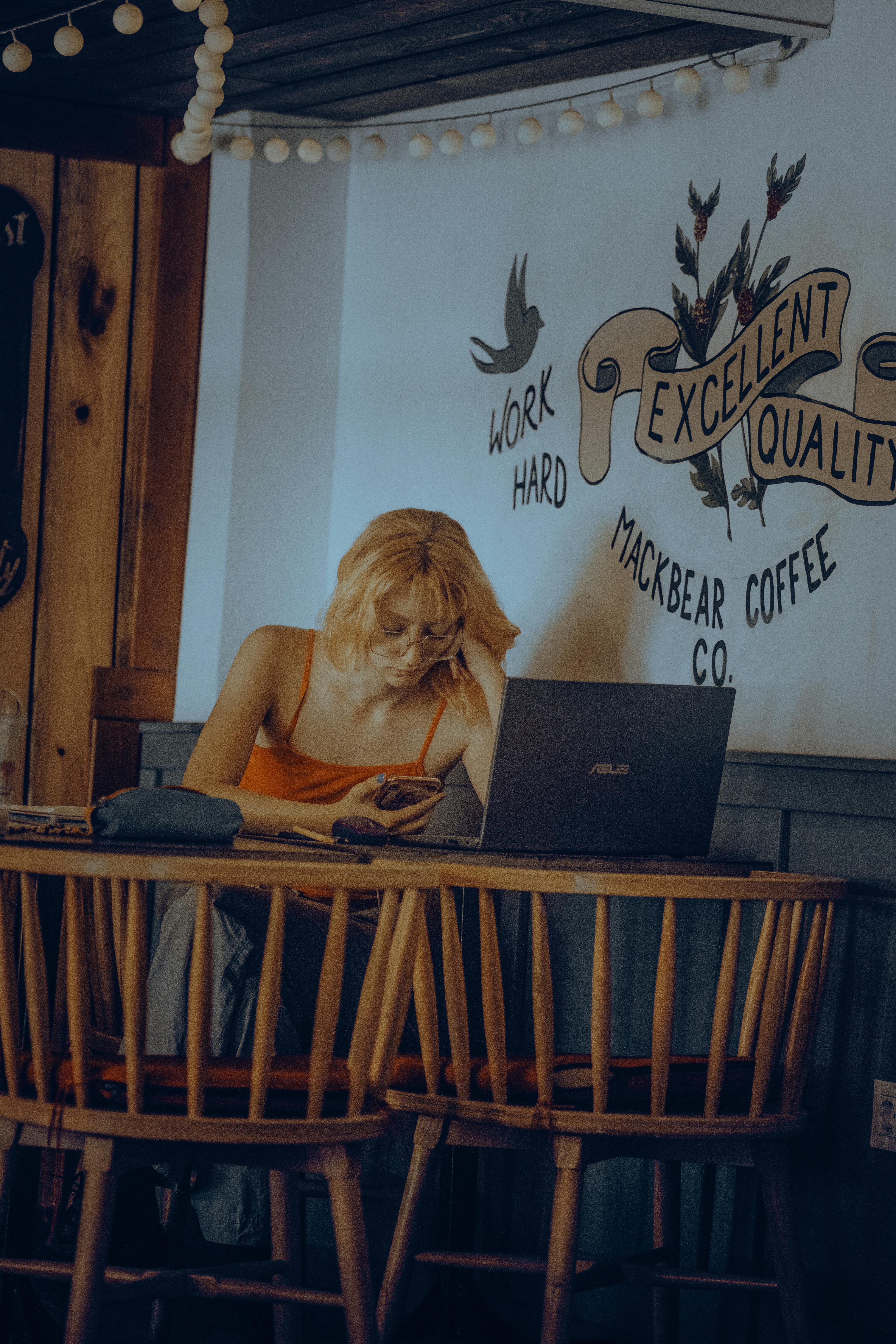 Modern Laptop and Coffee on Cafe Table · Free Stock Photo