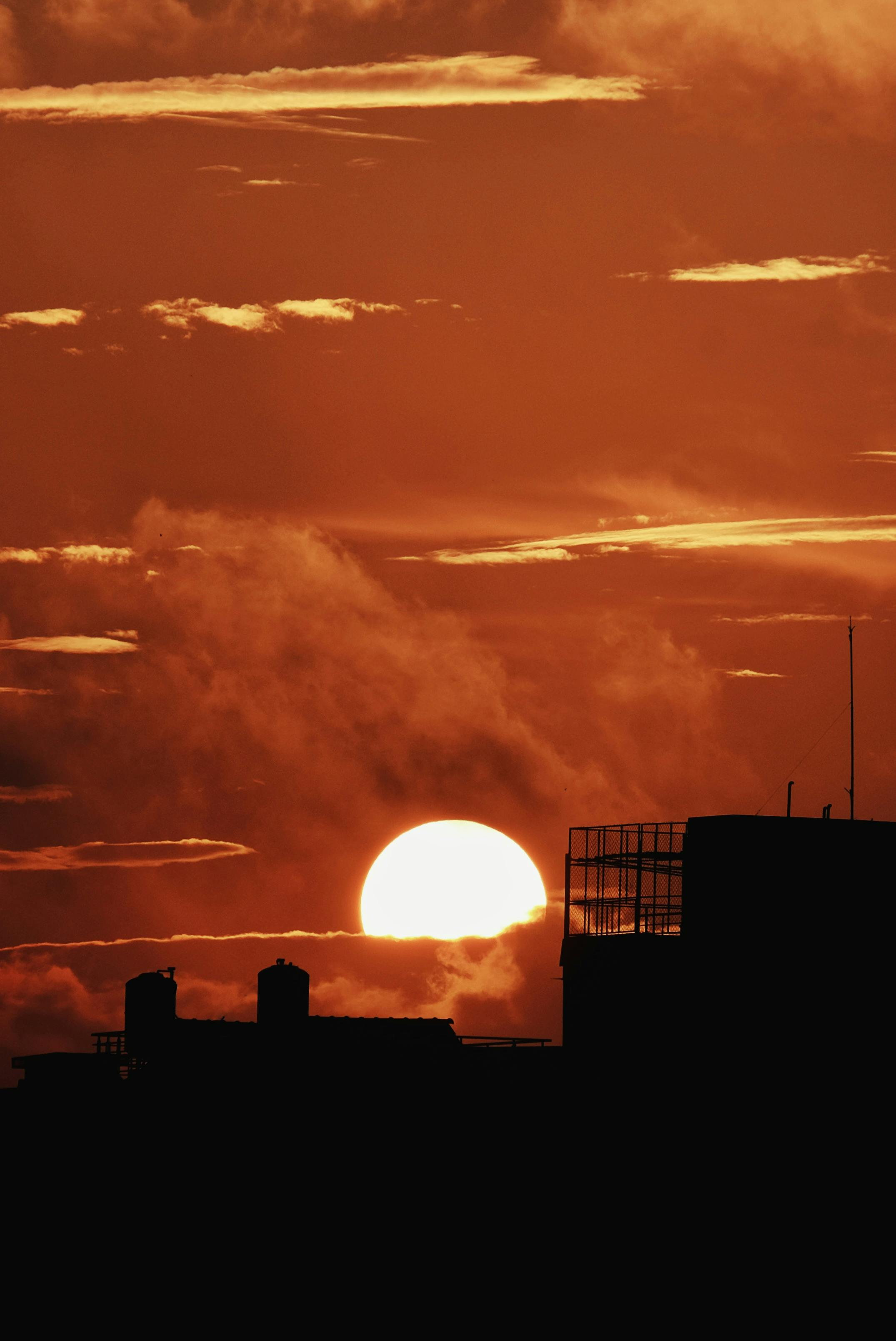 Silhouetted Buildings on the Background of a Sunset · Free Stock Photo
