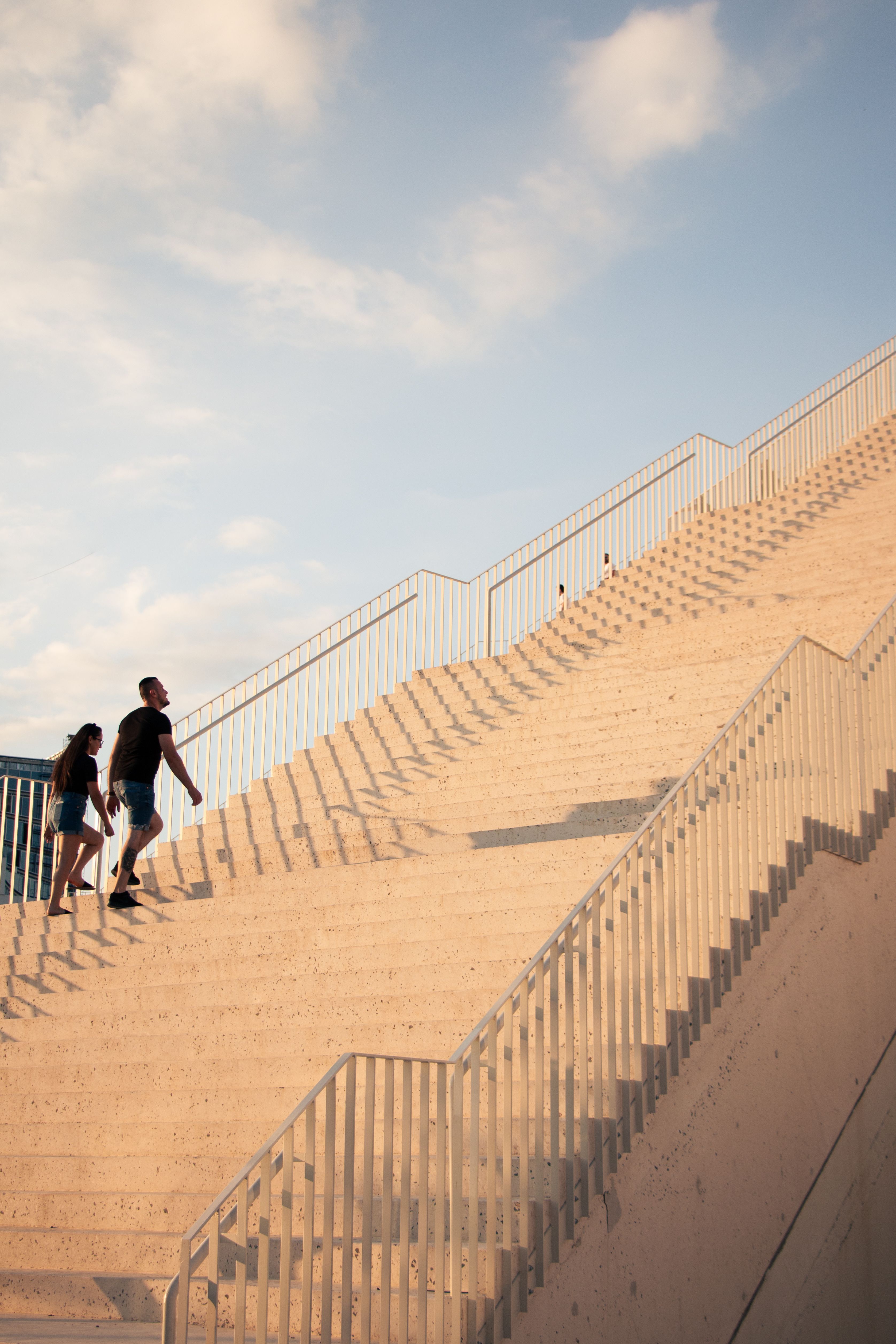 Couple Walking Upstairs · Free Stock Photo