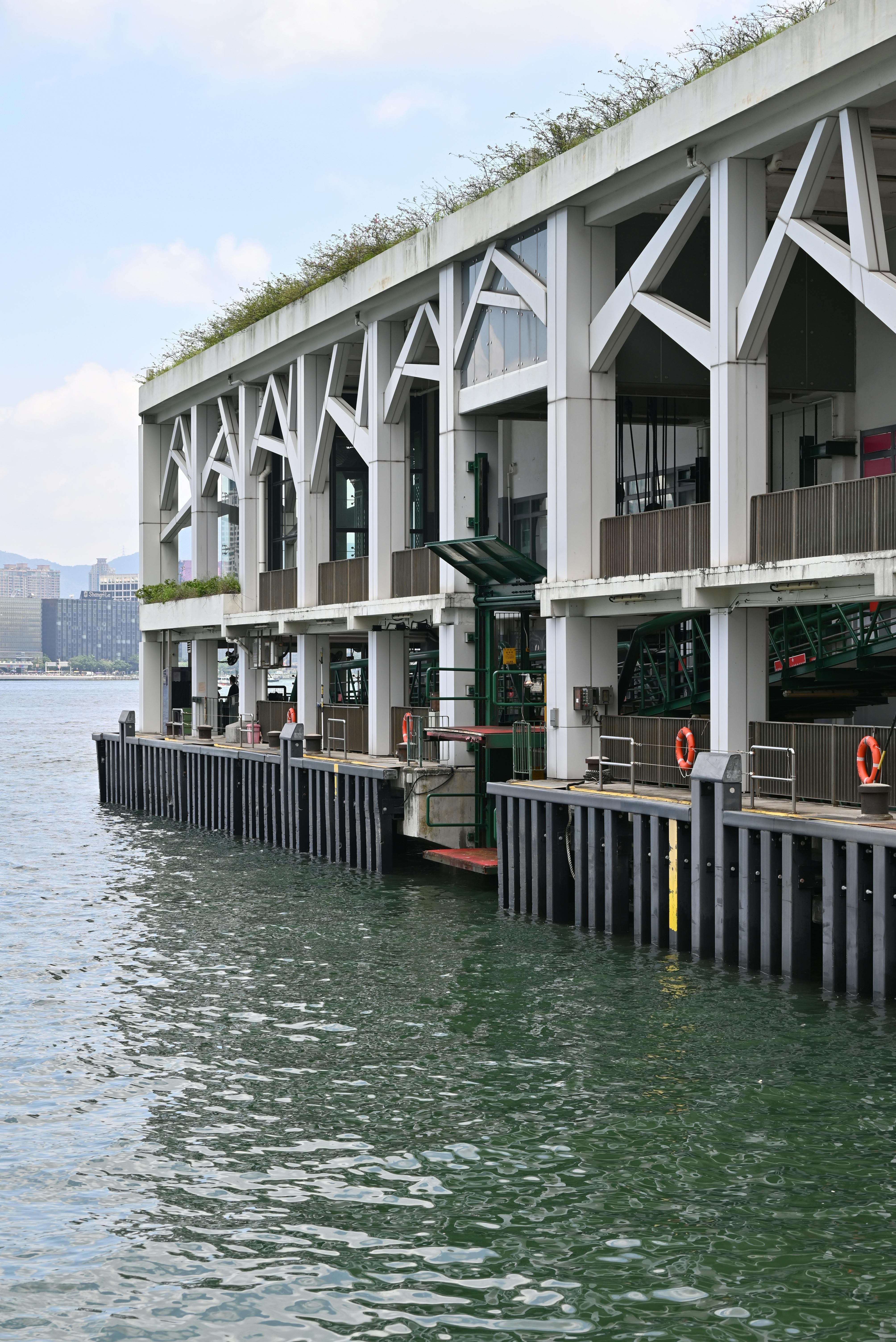 Facade of the Wan Chai Ferry Pier, Victoria Harbour, Hong Kong, China ...
