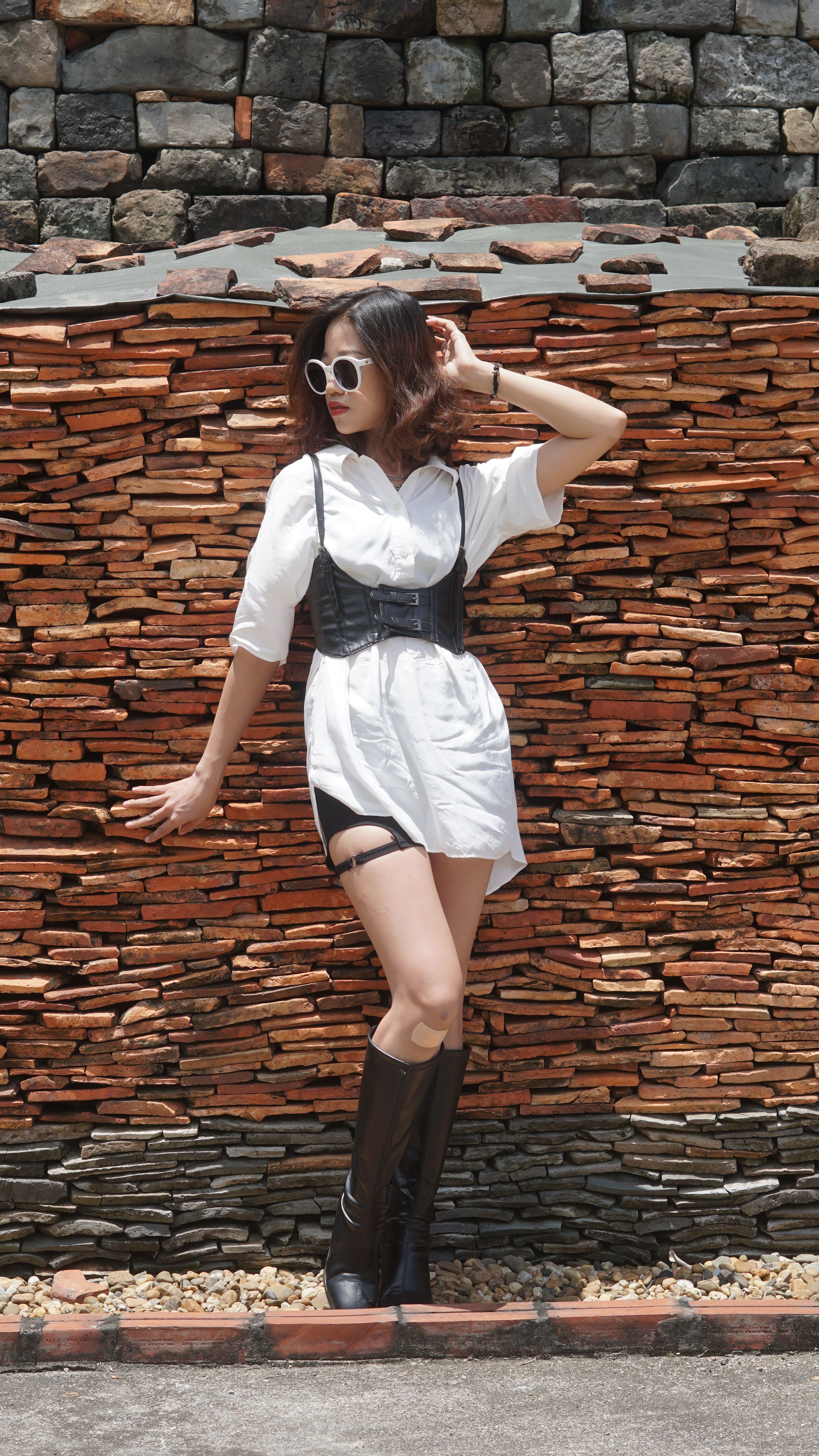 Woman Posing by Wall · Free Stock Photo