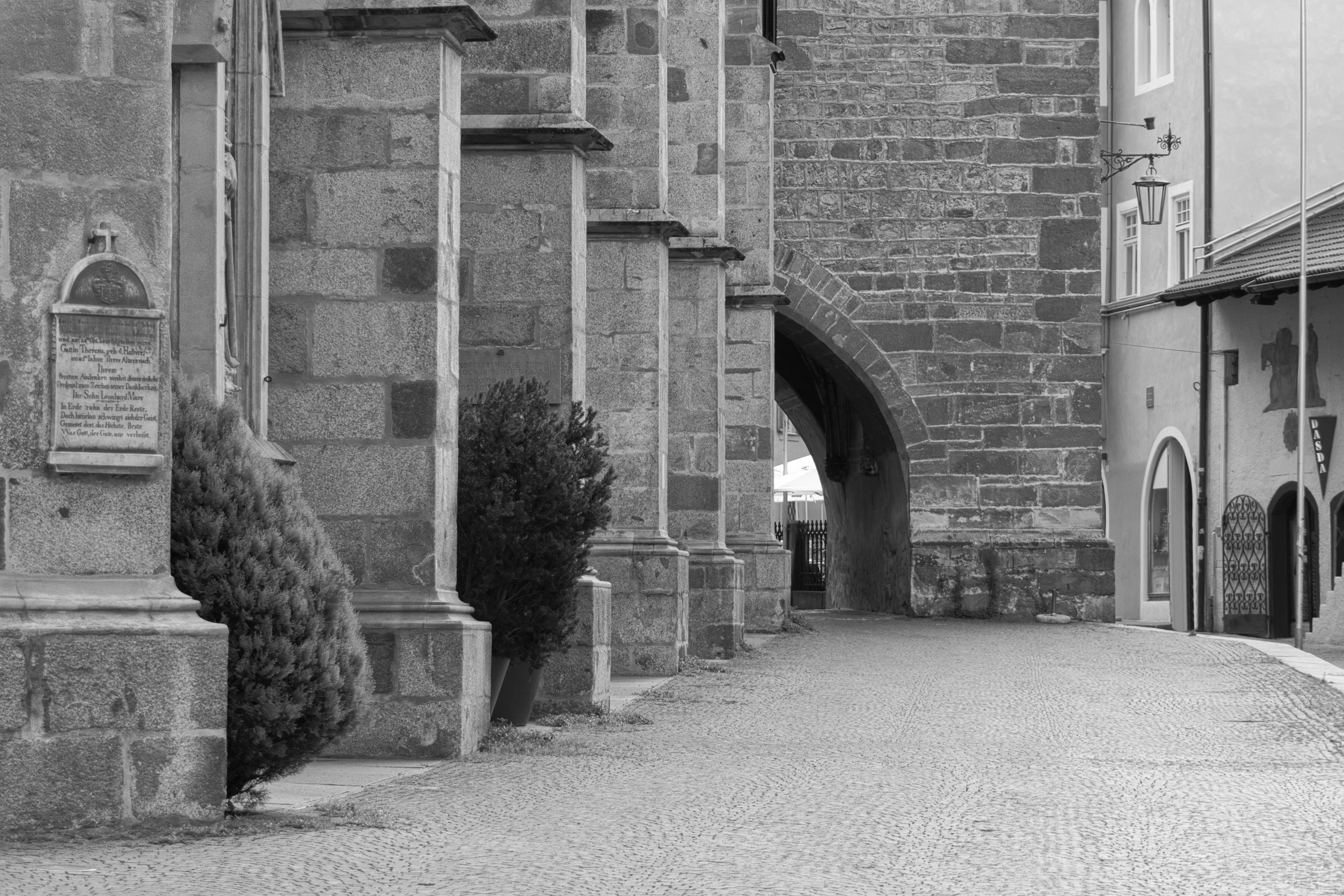 Church Wall and Ached Walkway · Free Stock Photo