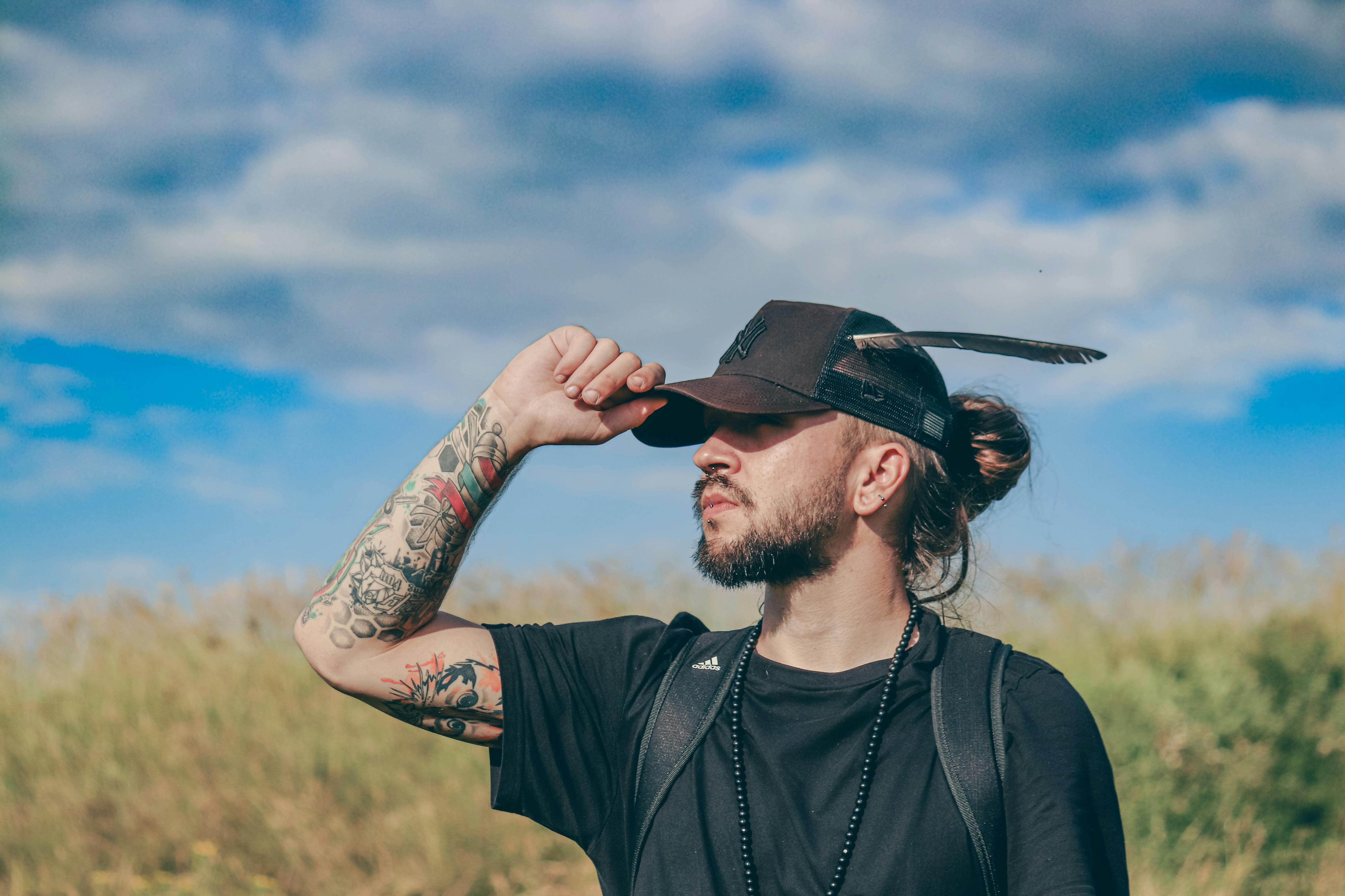 Man in Cap, Eyeglasses and with Moustache · Free Stock Photo