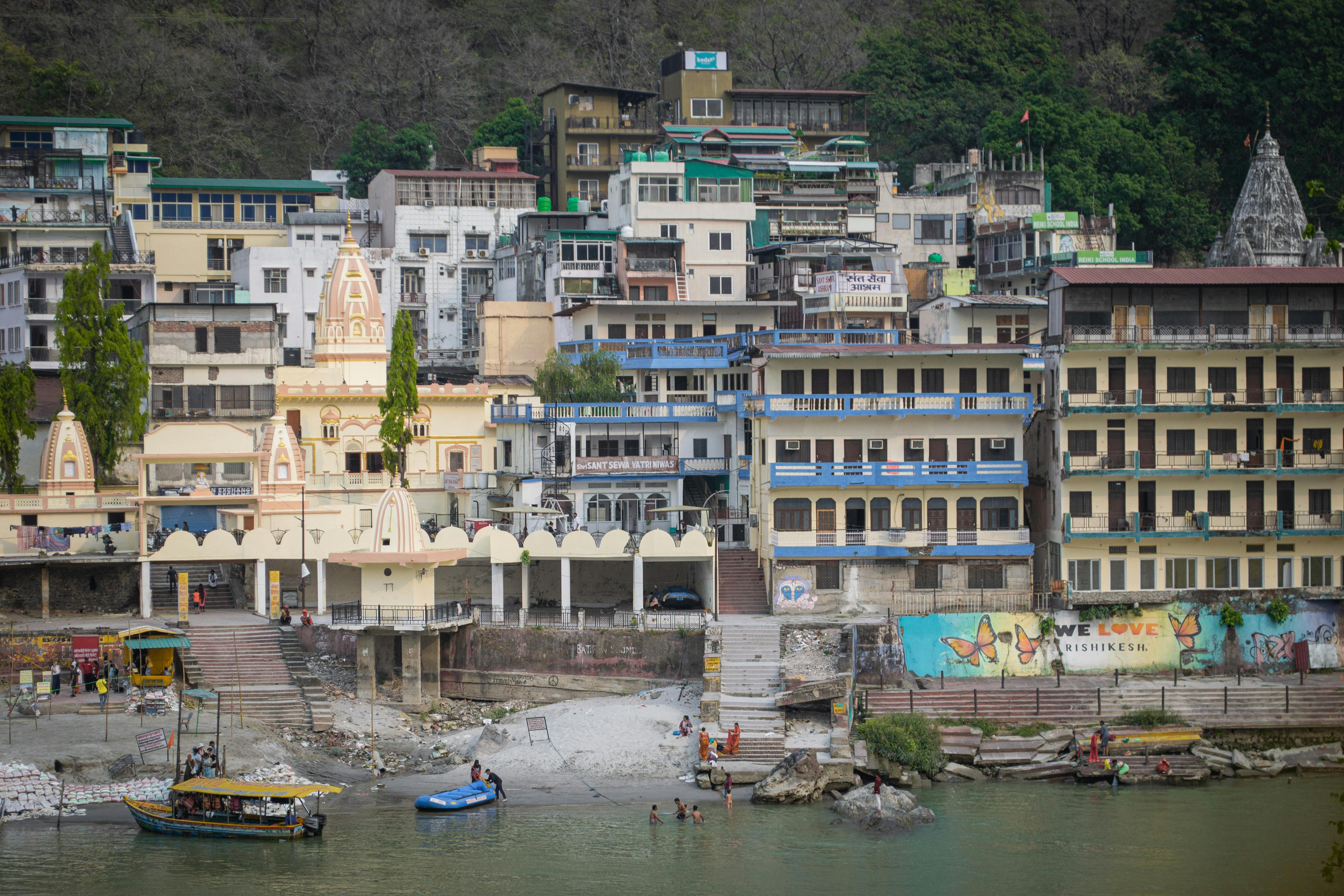 Buildings by River in Town in India · Free Stock Photo
