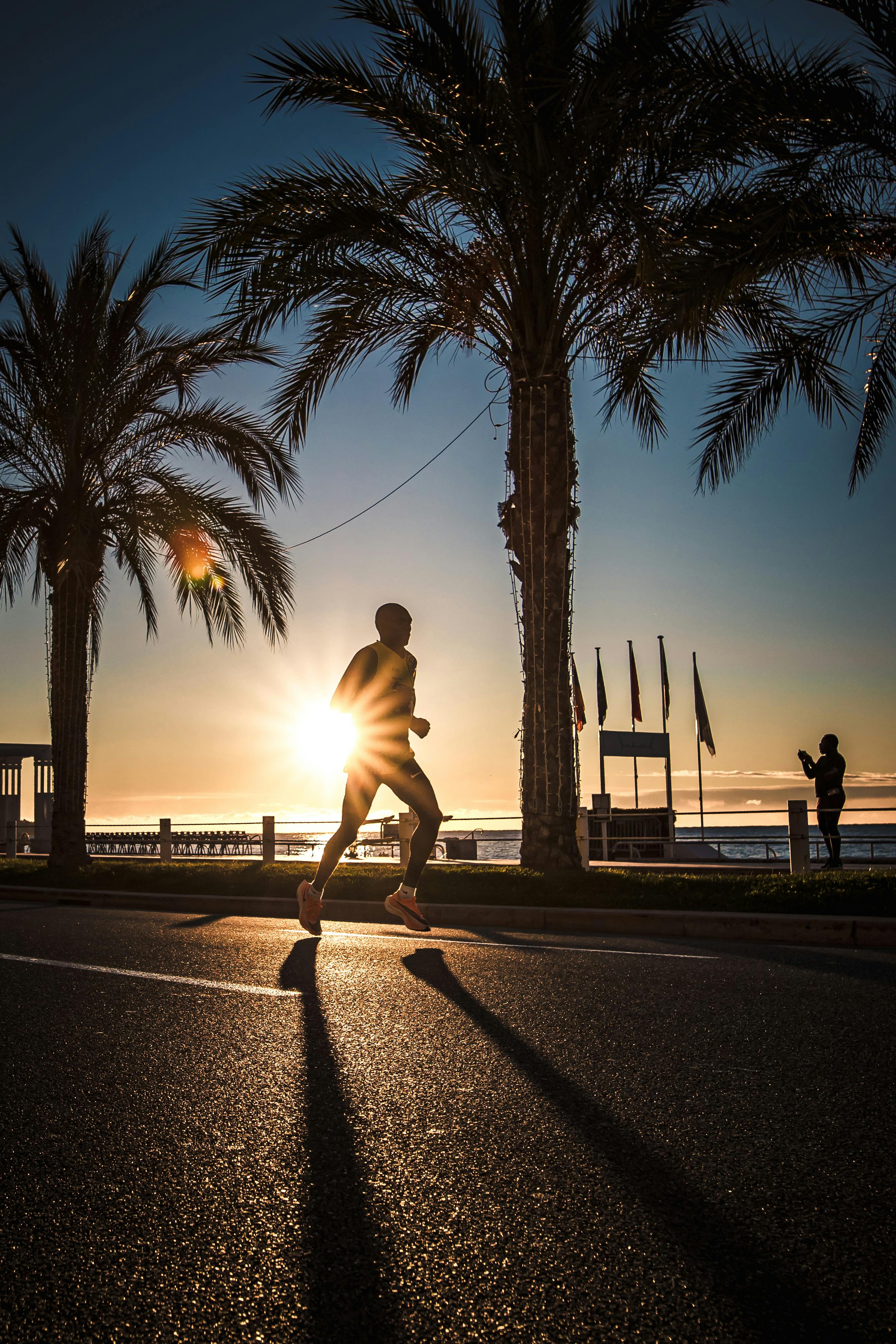 Man Running on Street at Sunset · Free Stock Photo