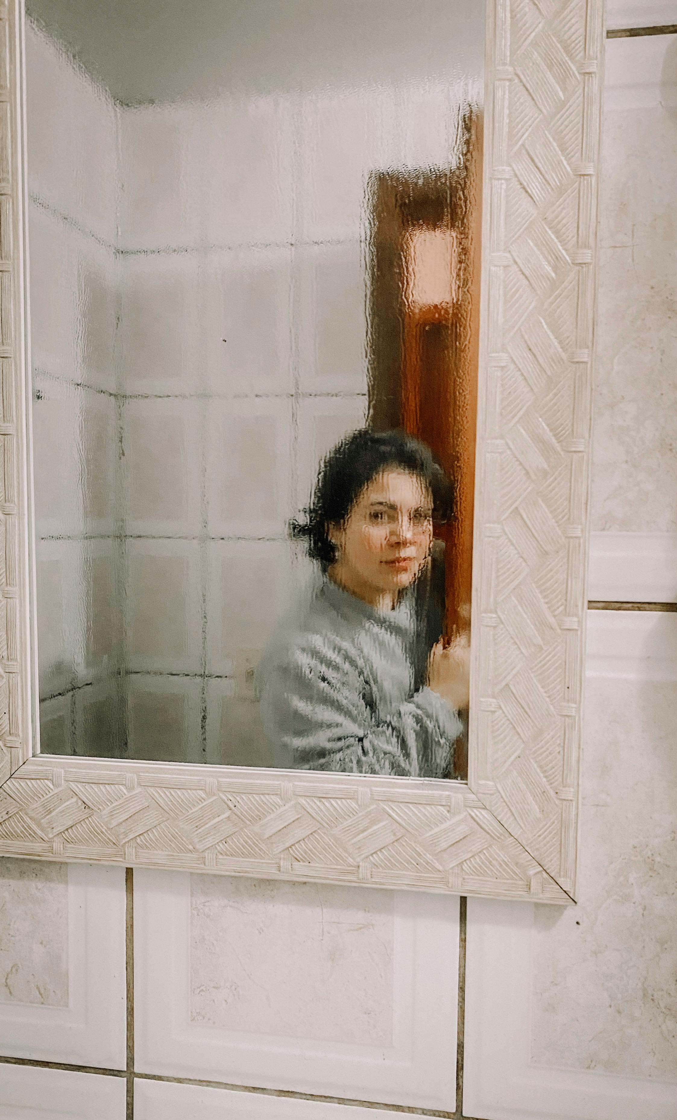 Blurred Reflection of Woman in Mirror · Free Stock Photo