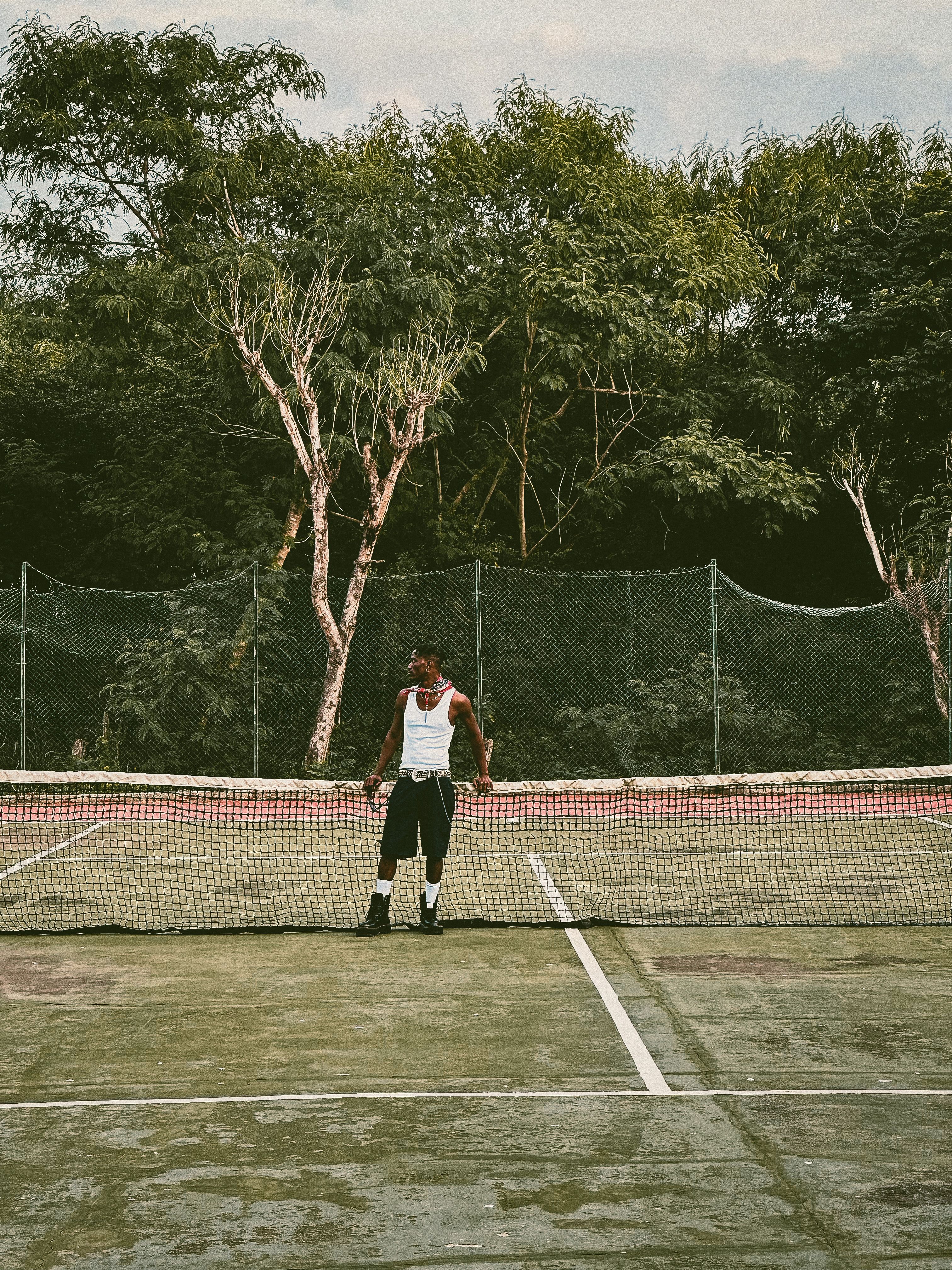 Man Standing on Tennis Court · Free Stock Photo