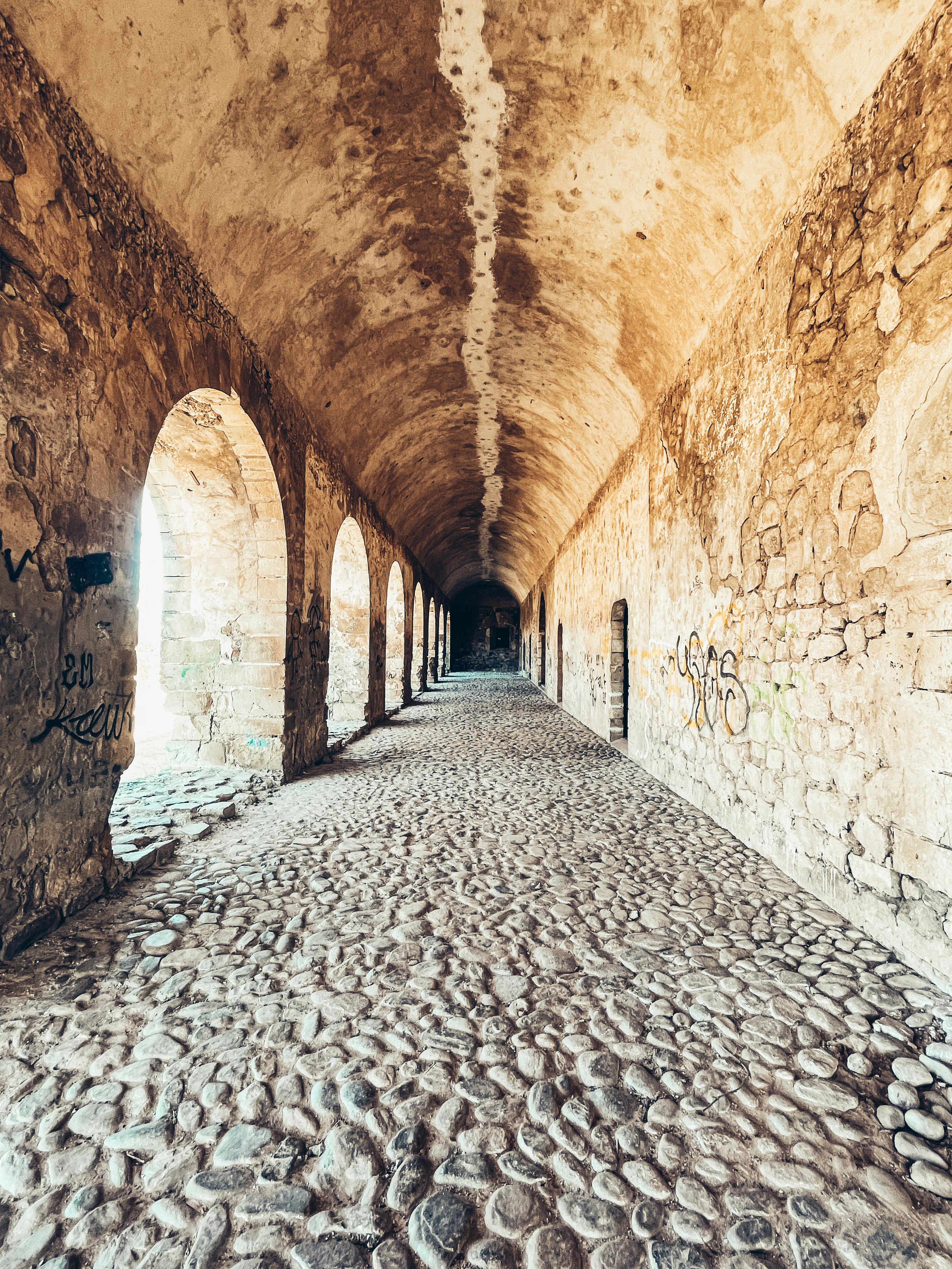 Cobblestone Pavement in Corridor · Free Stock Photo