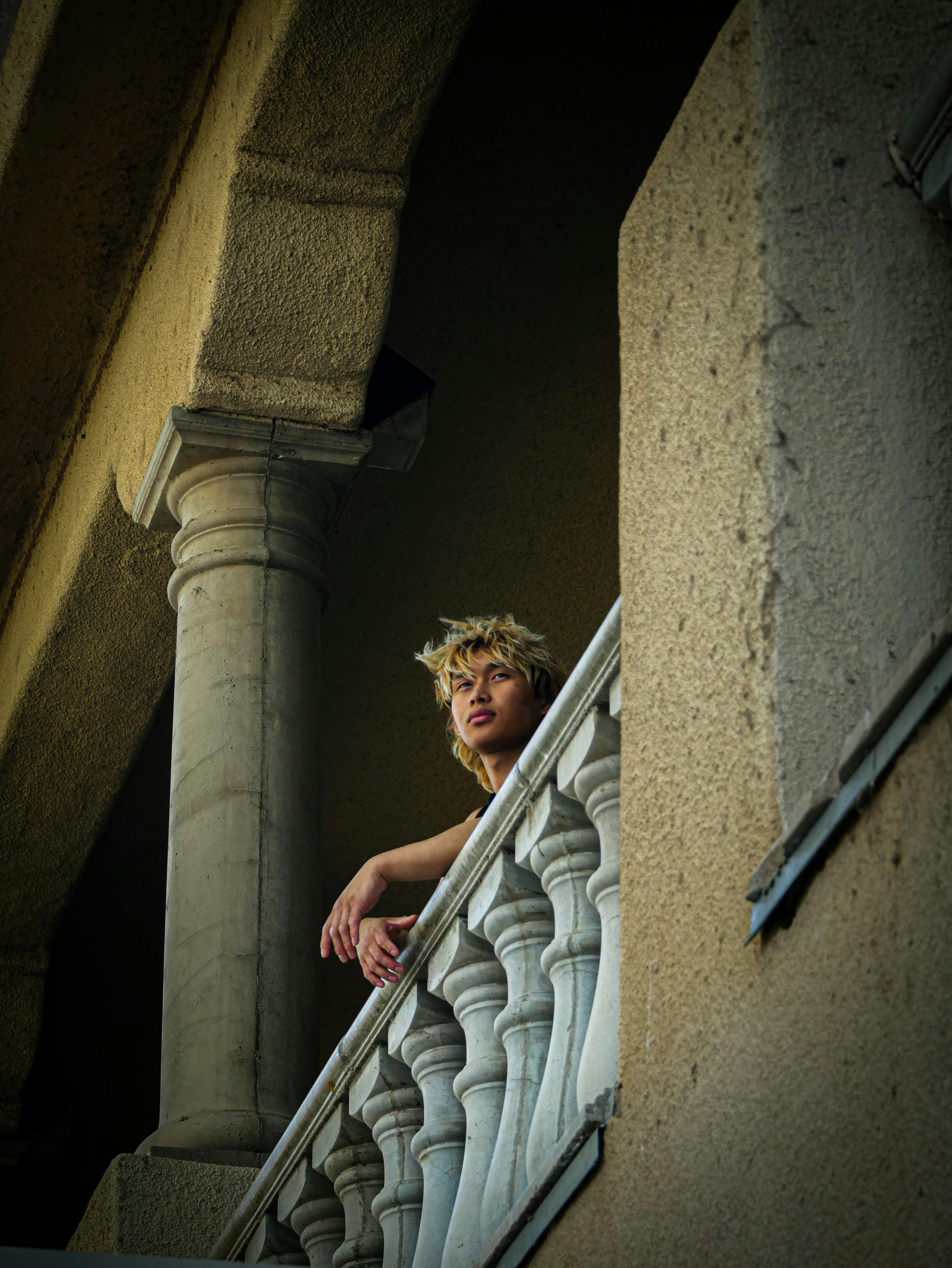 Man behind Railing · Free Stock Photo