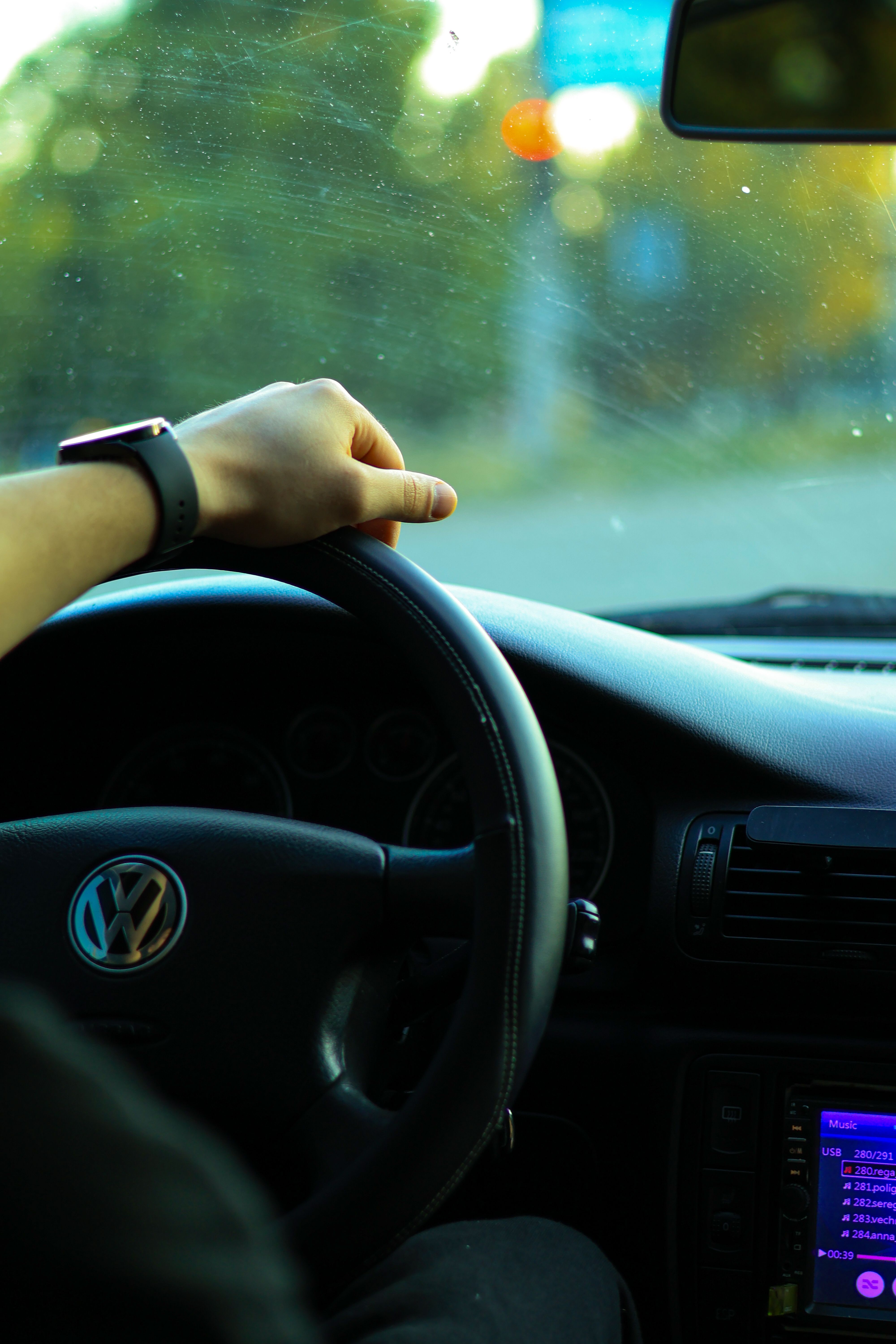 Man Hand on Steering Wheel · Free Stock Photo