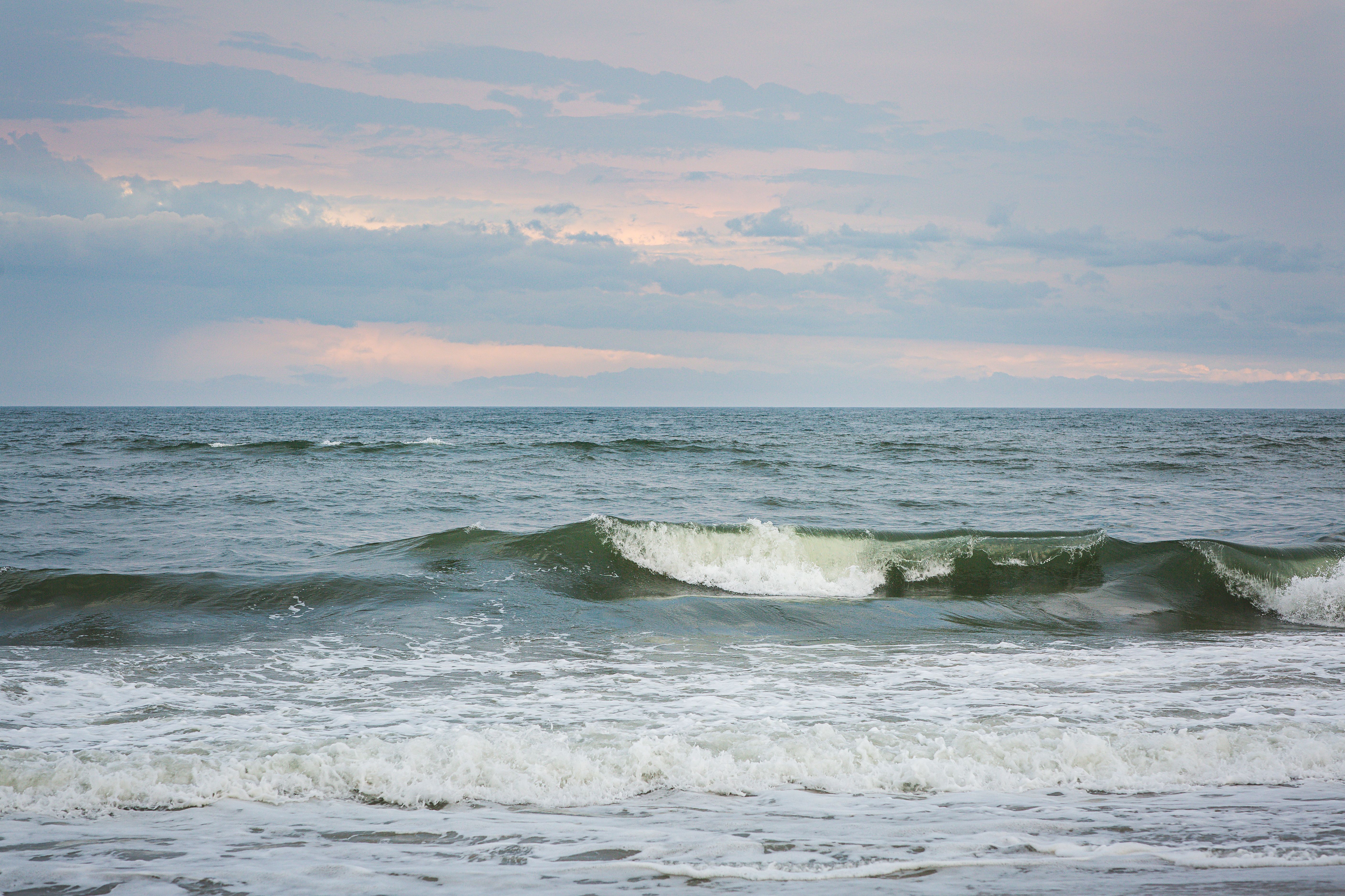Photo Of Seaside During Dawn · Free Stock Photo