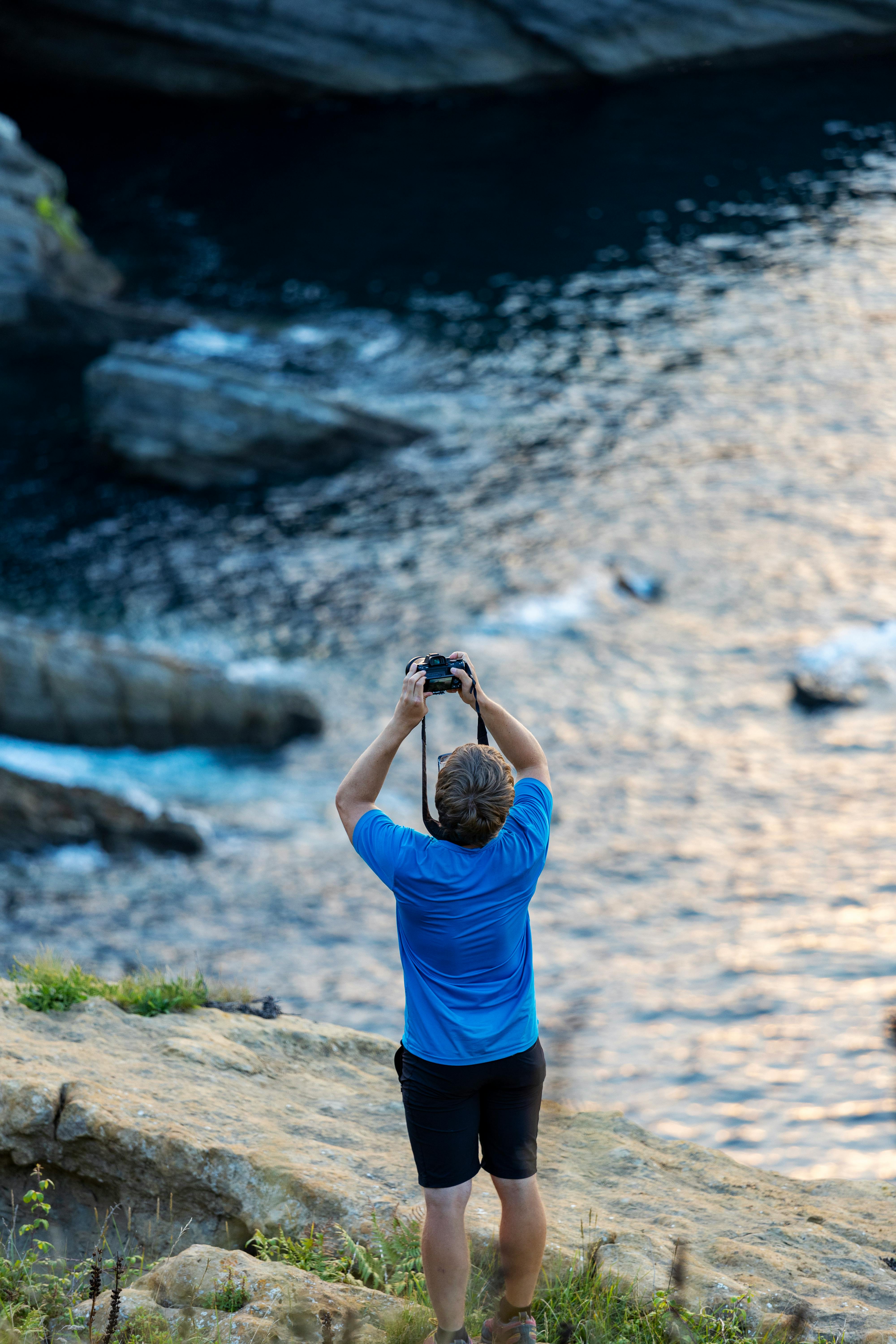 Landscape Photography of Lighthouse Near Body of Water · Free Stock Photo