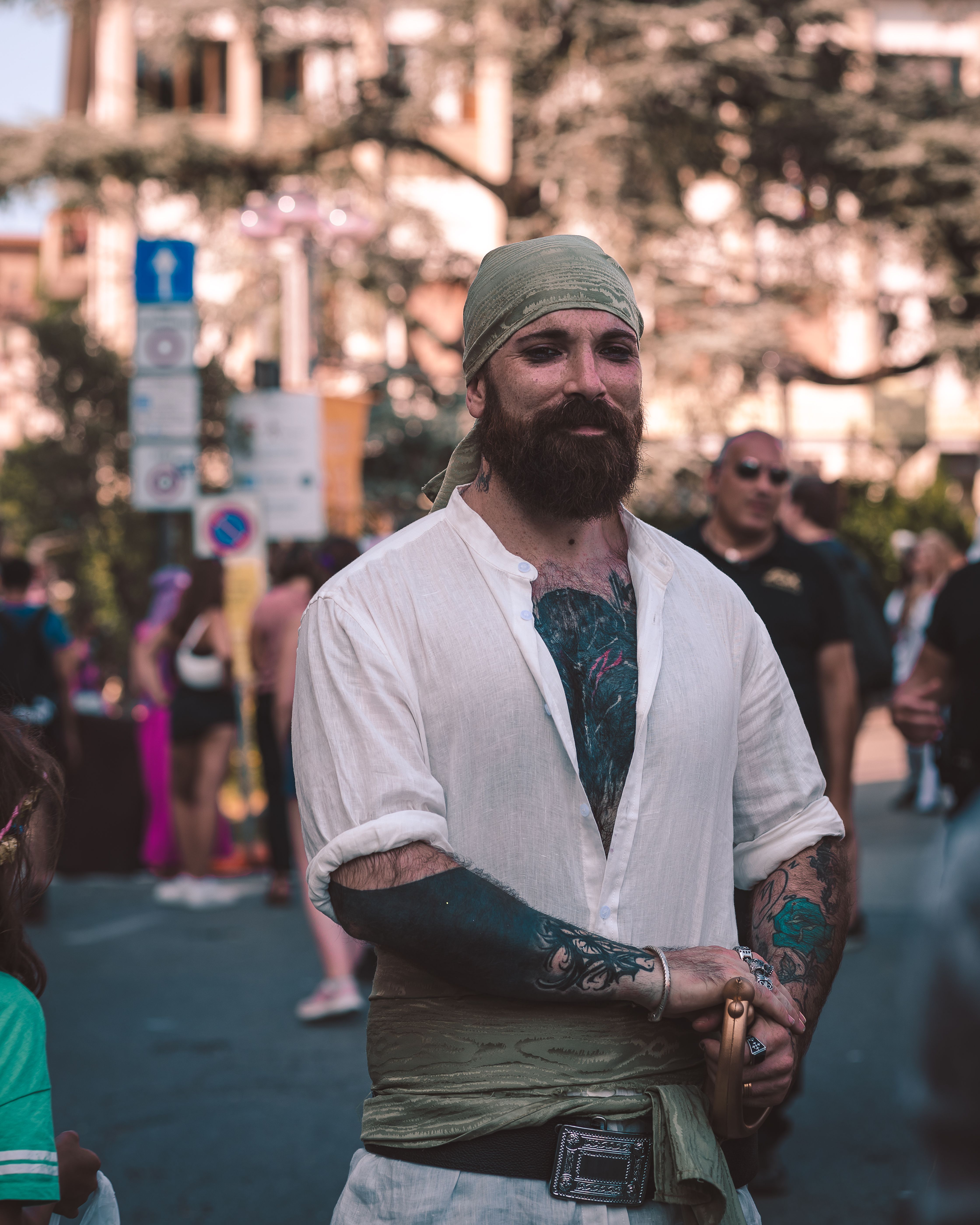 Men in Costumes Fighting on Street · Free Stock Photo