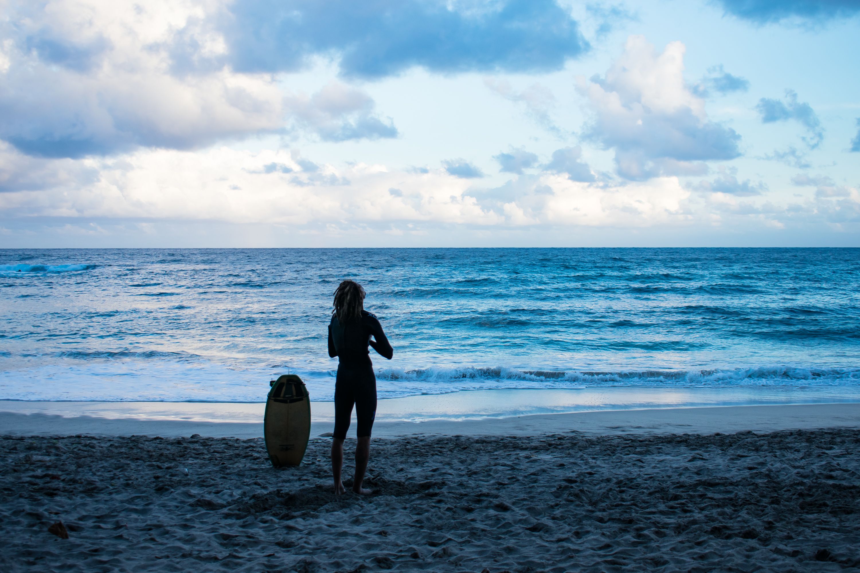 Person Standing Near Seashore · Free Stock Photo