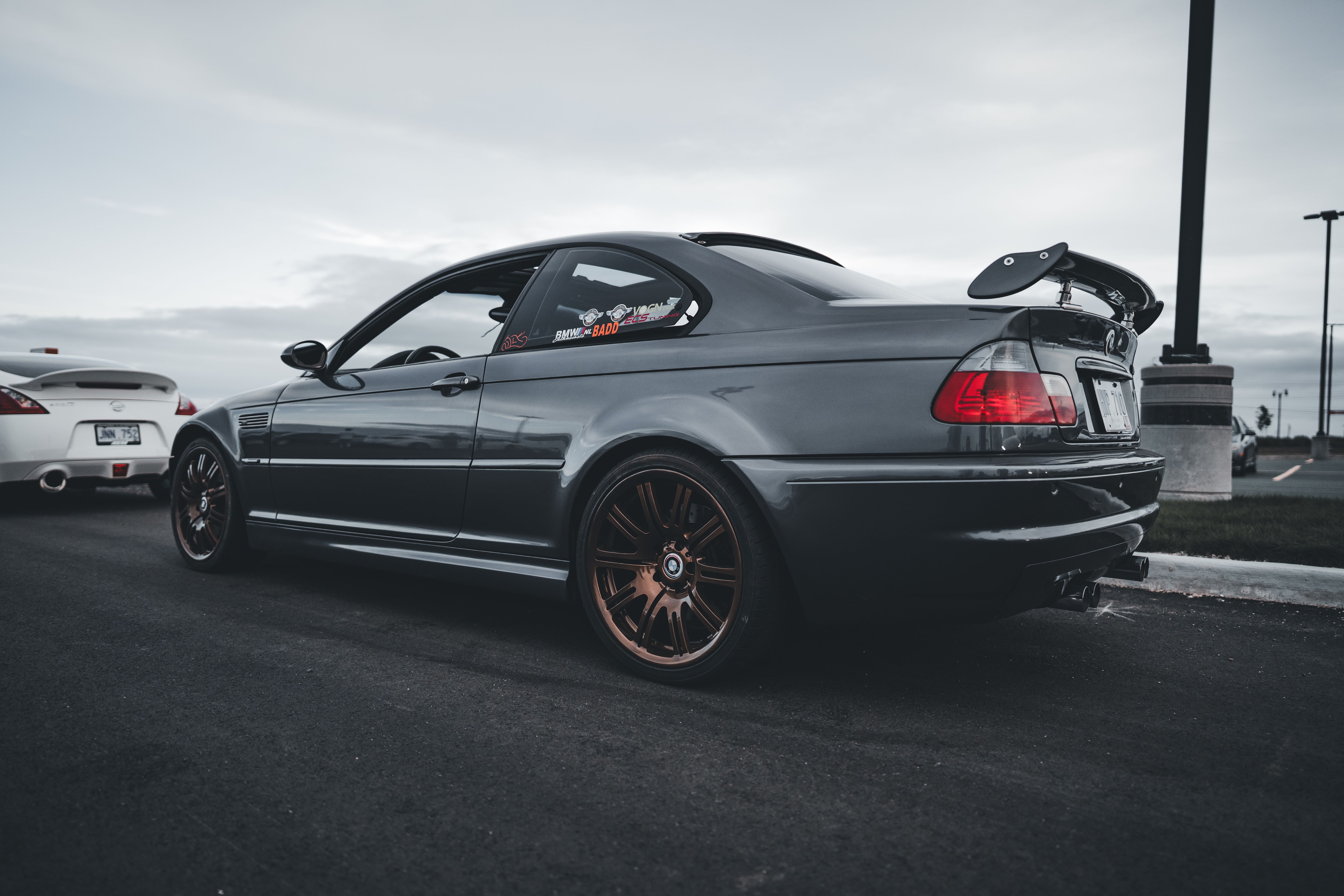 A bmw m3 with a black and orange paint job · Free Stock Photo