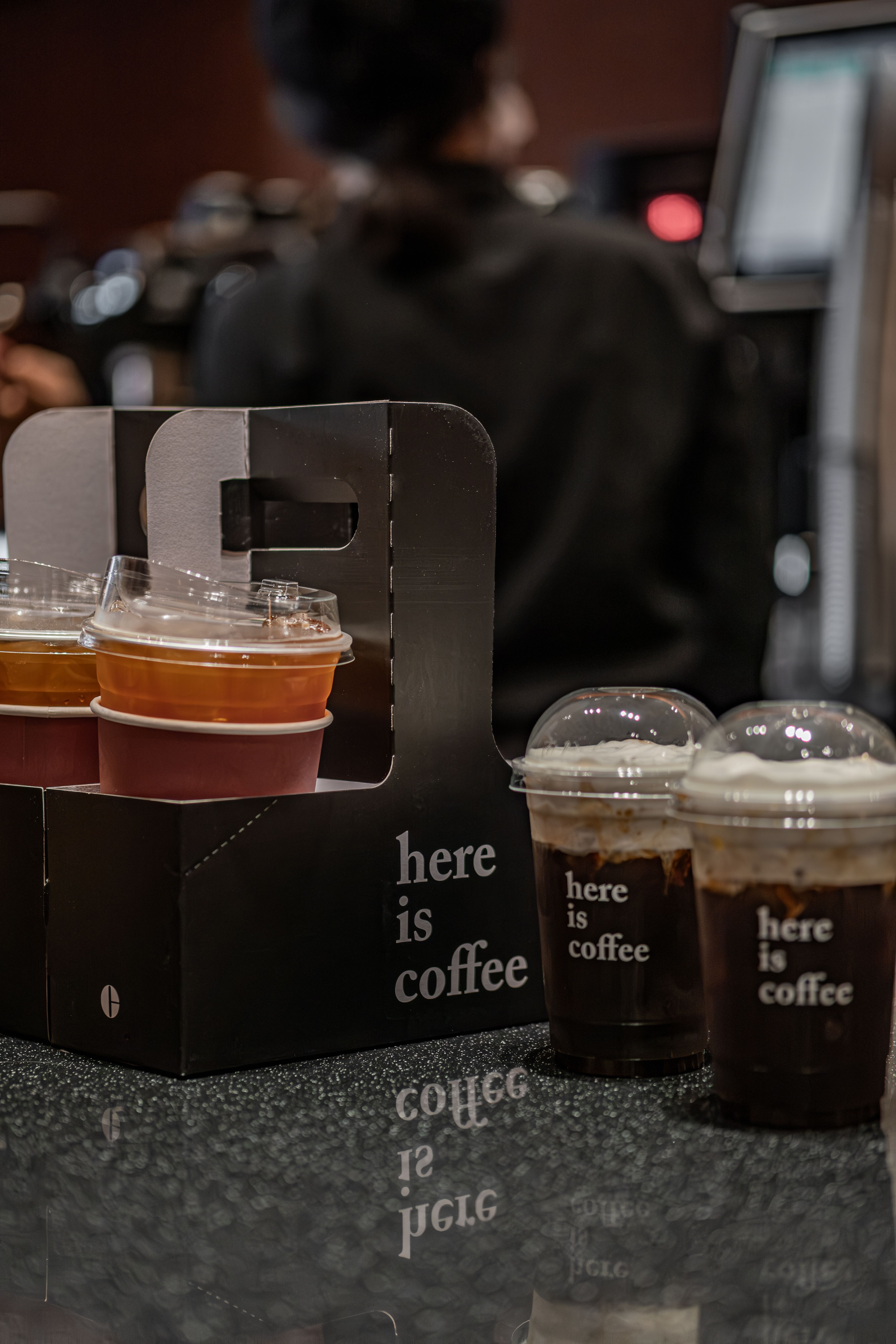 A coffee stand with cups and cups on it · Free Stock Photo