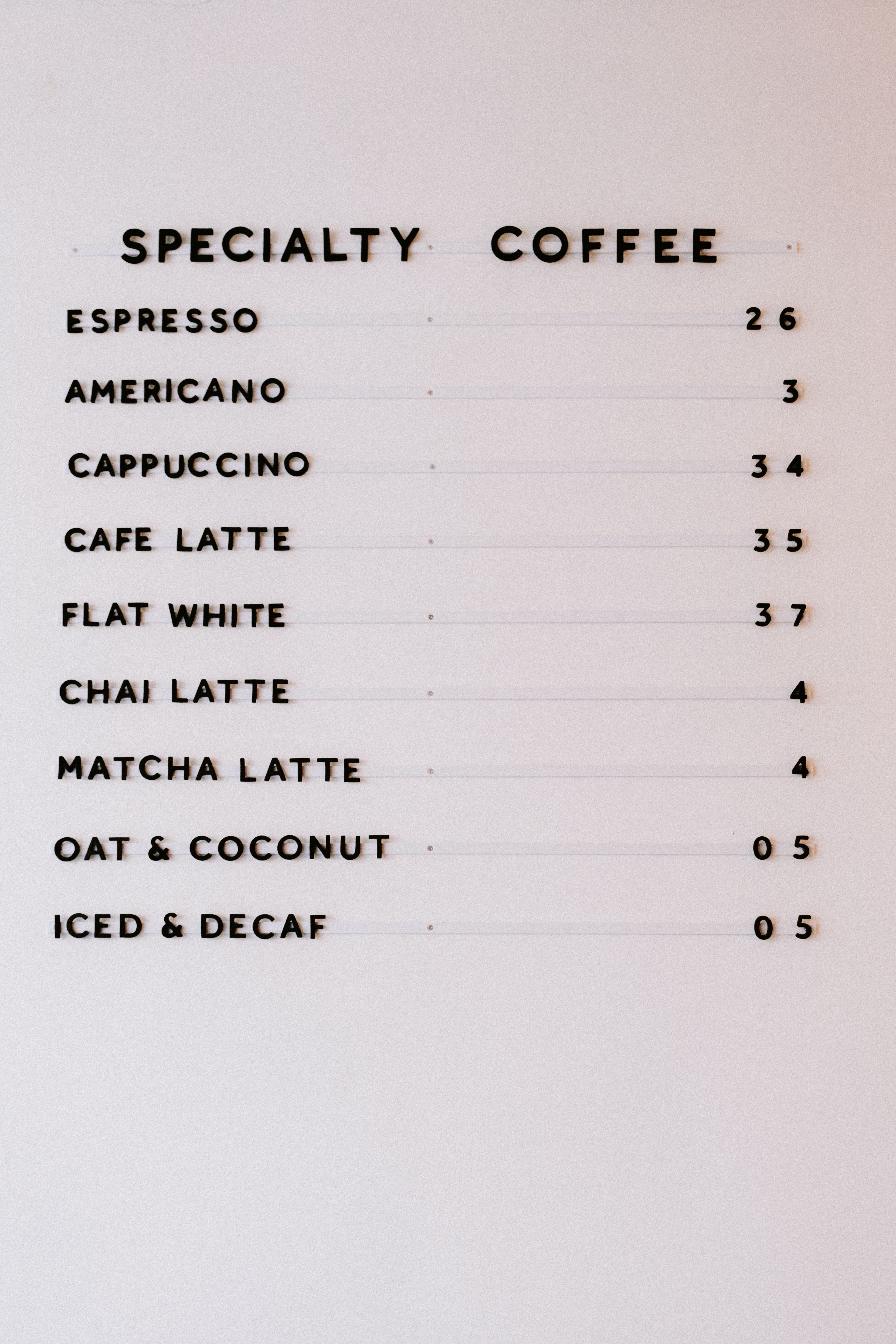 A menu for specialty coffee with prices · Free Stock Photo