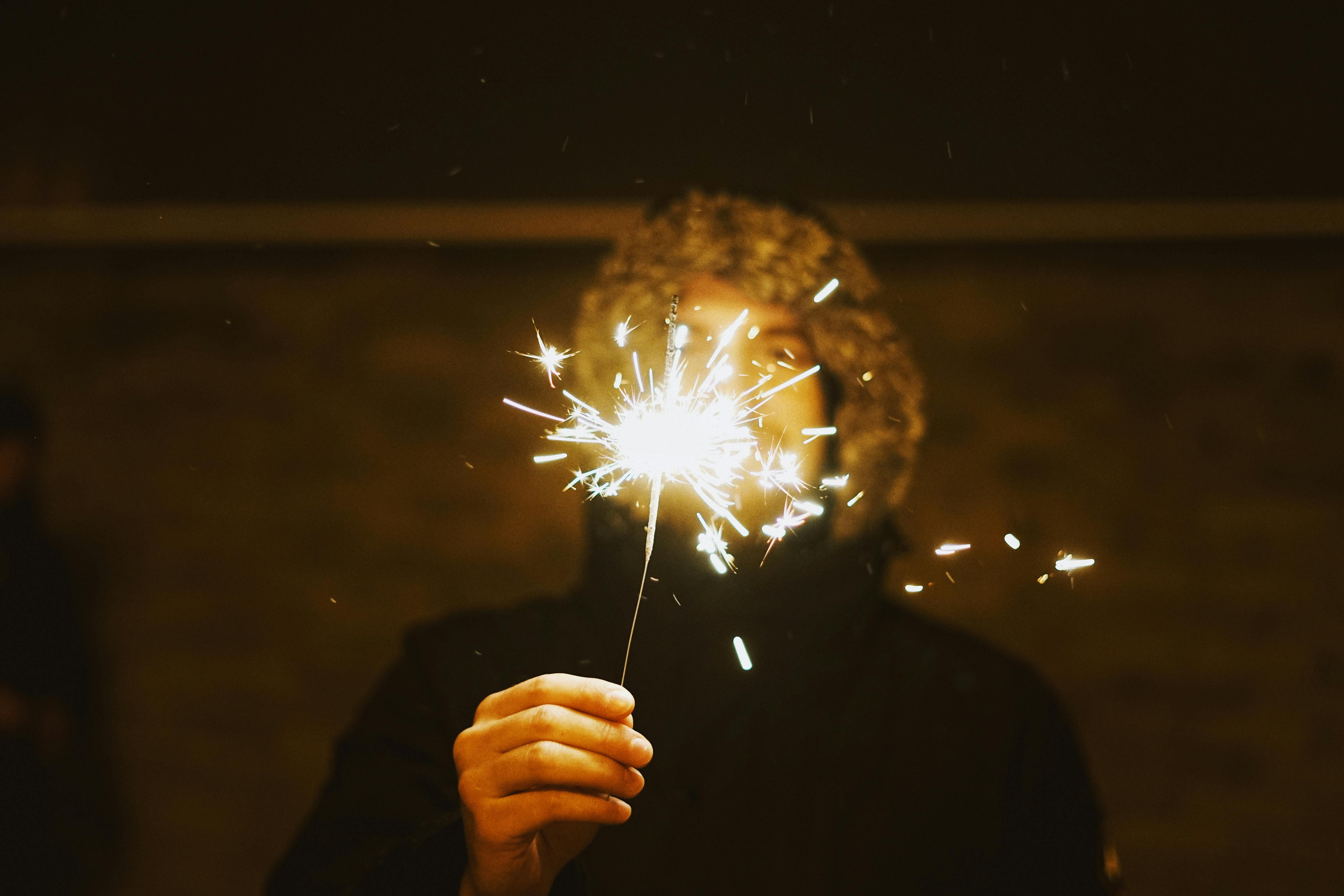 Man Holding Sparkler · Free Stock Photo