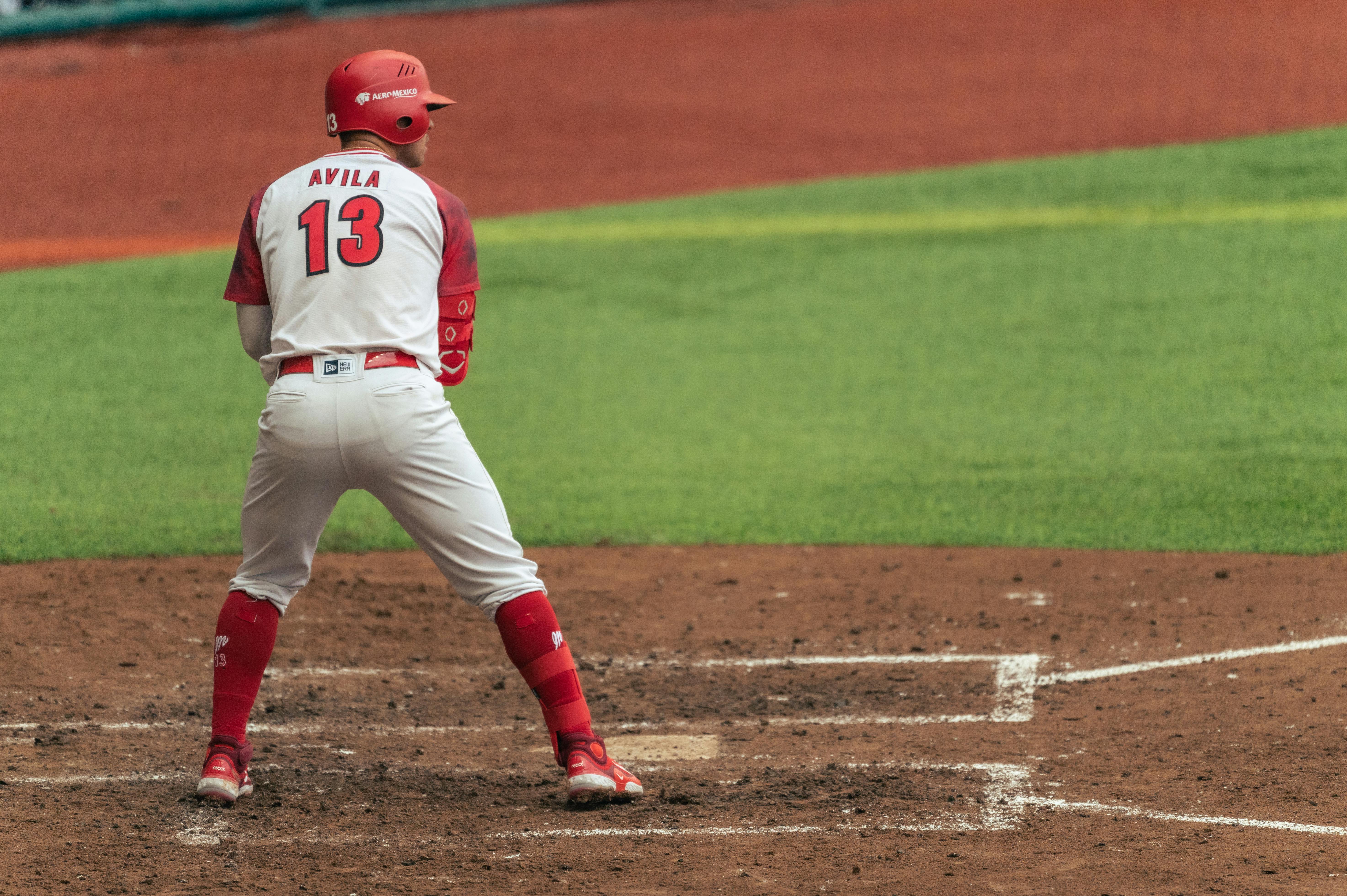 Baseball Player Running on Court · Free Stock Photo