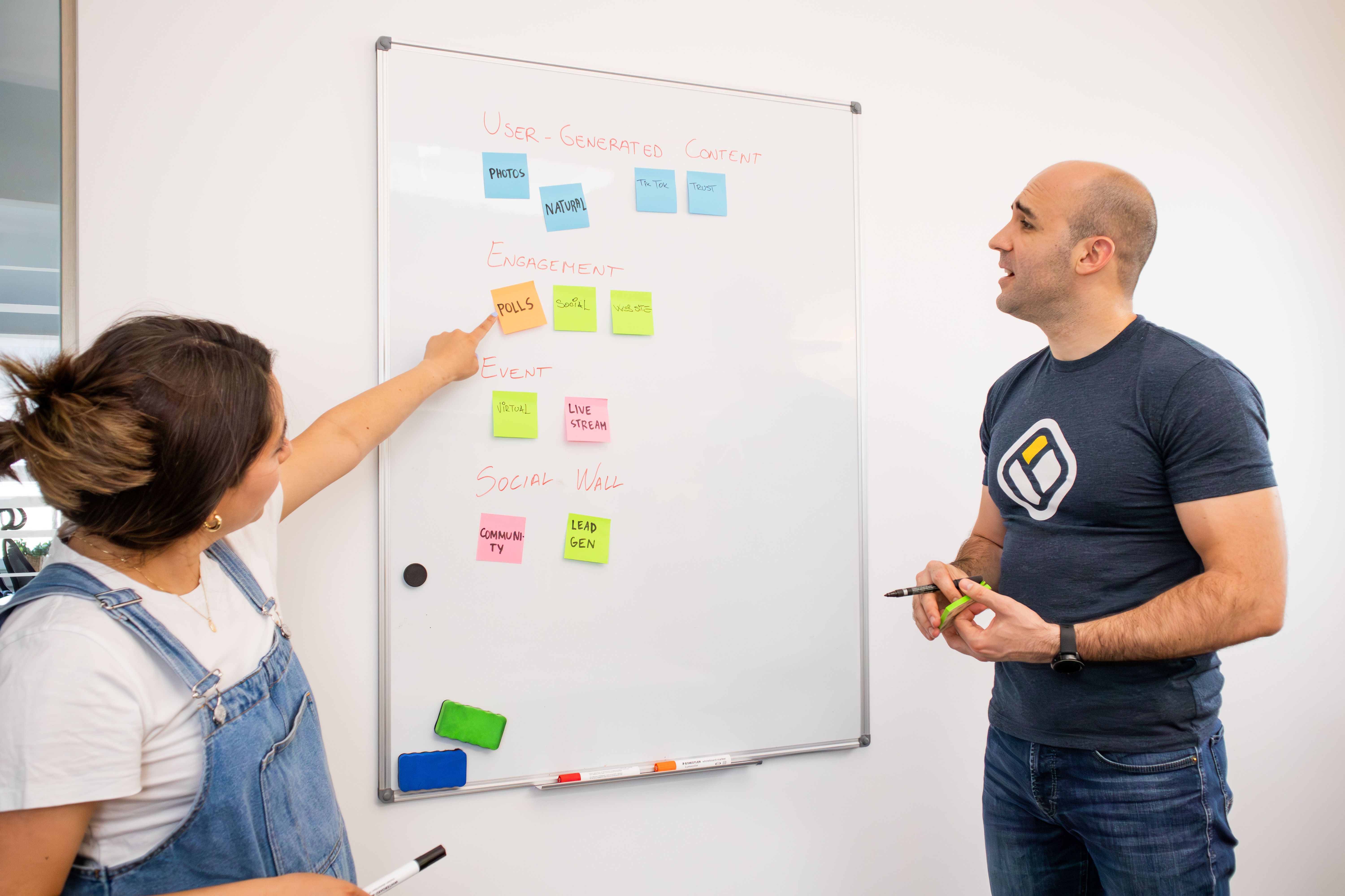 Woman and Man Working on Whiteboard · Free Stock Photo