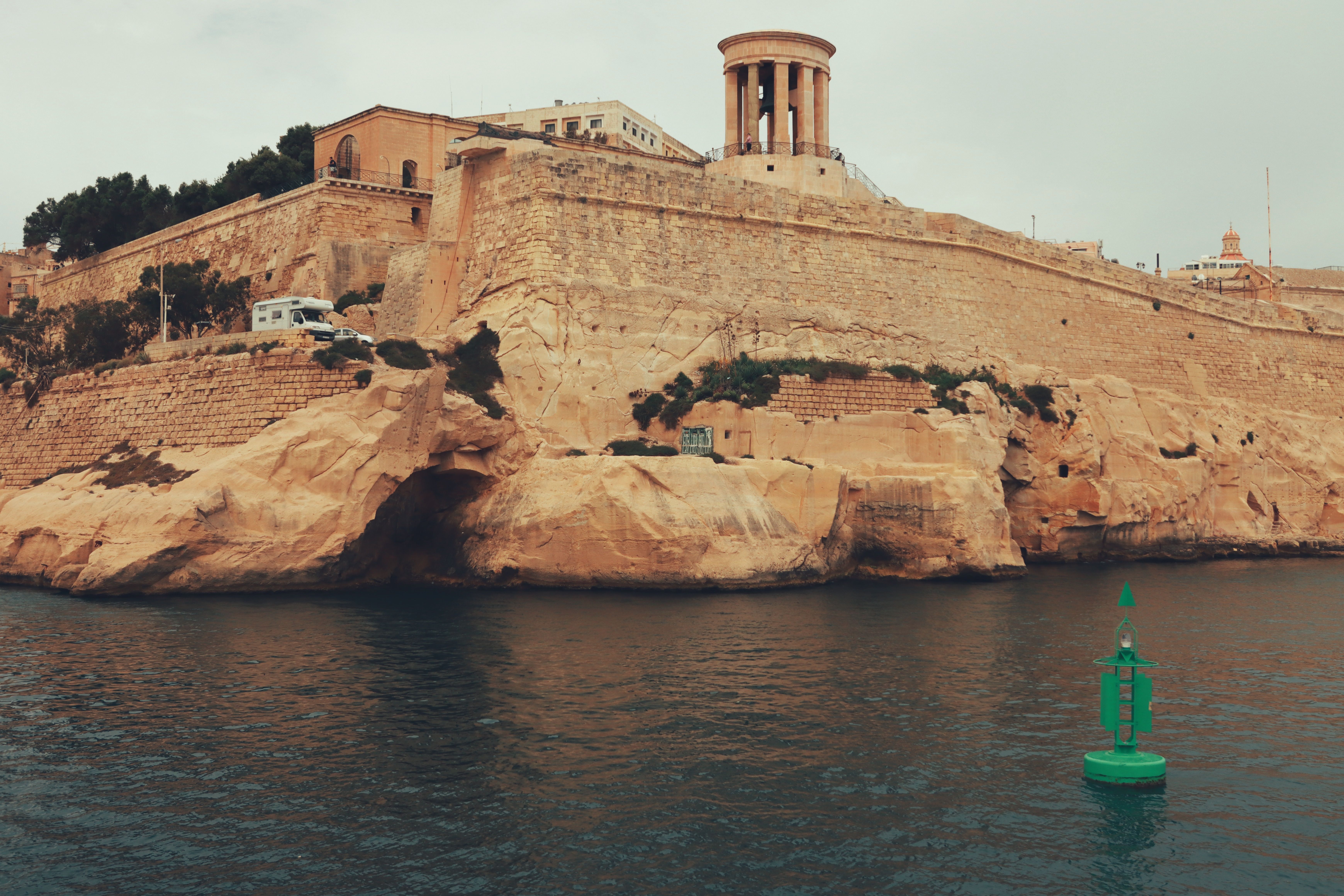 Siege Bell War Memorial on Sea Shore in Valletta · Free Stock Photo