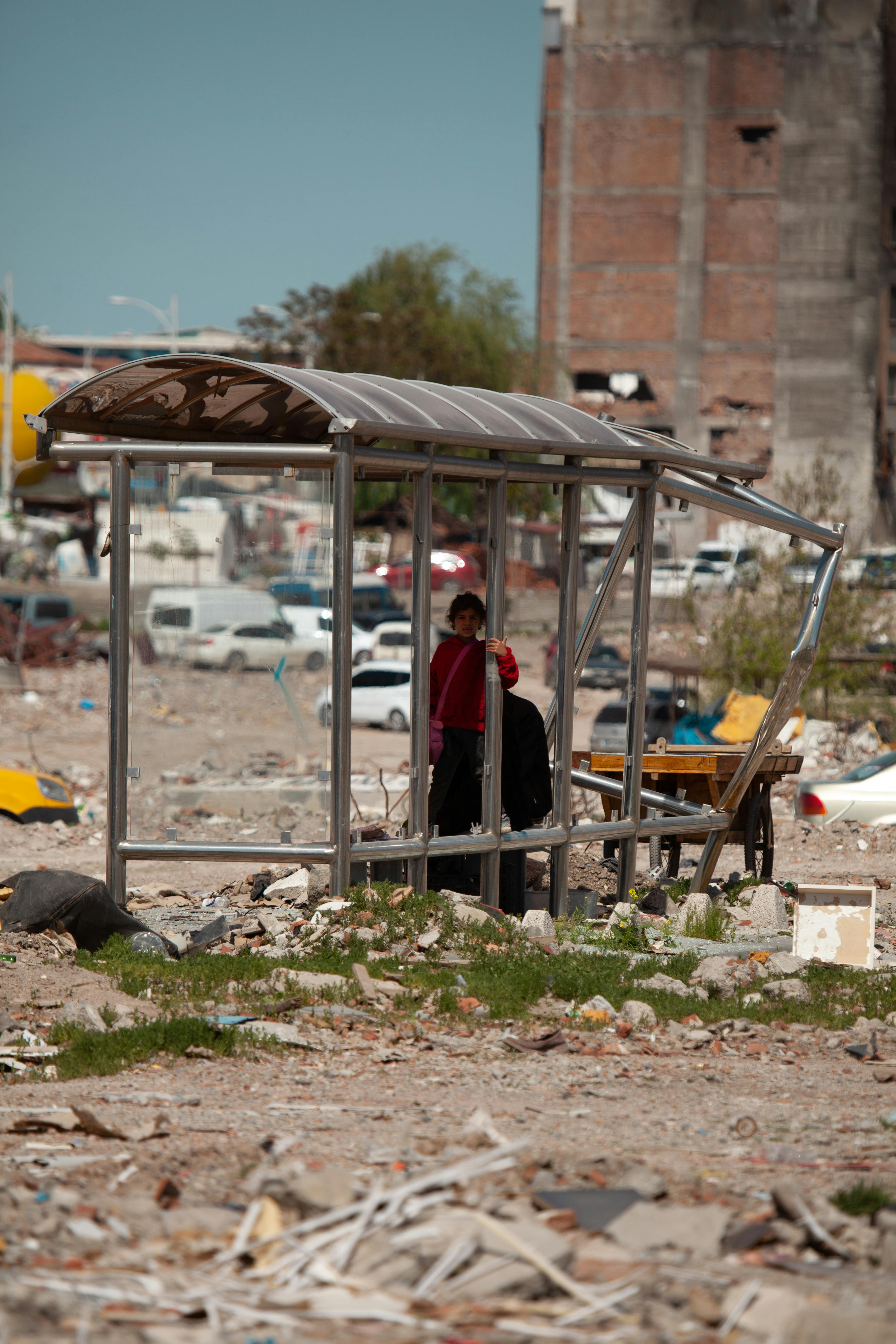 Bus Stop in a Demolished City · Free Stock Photo