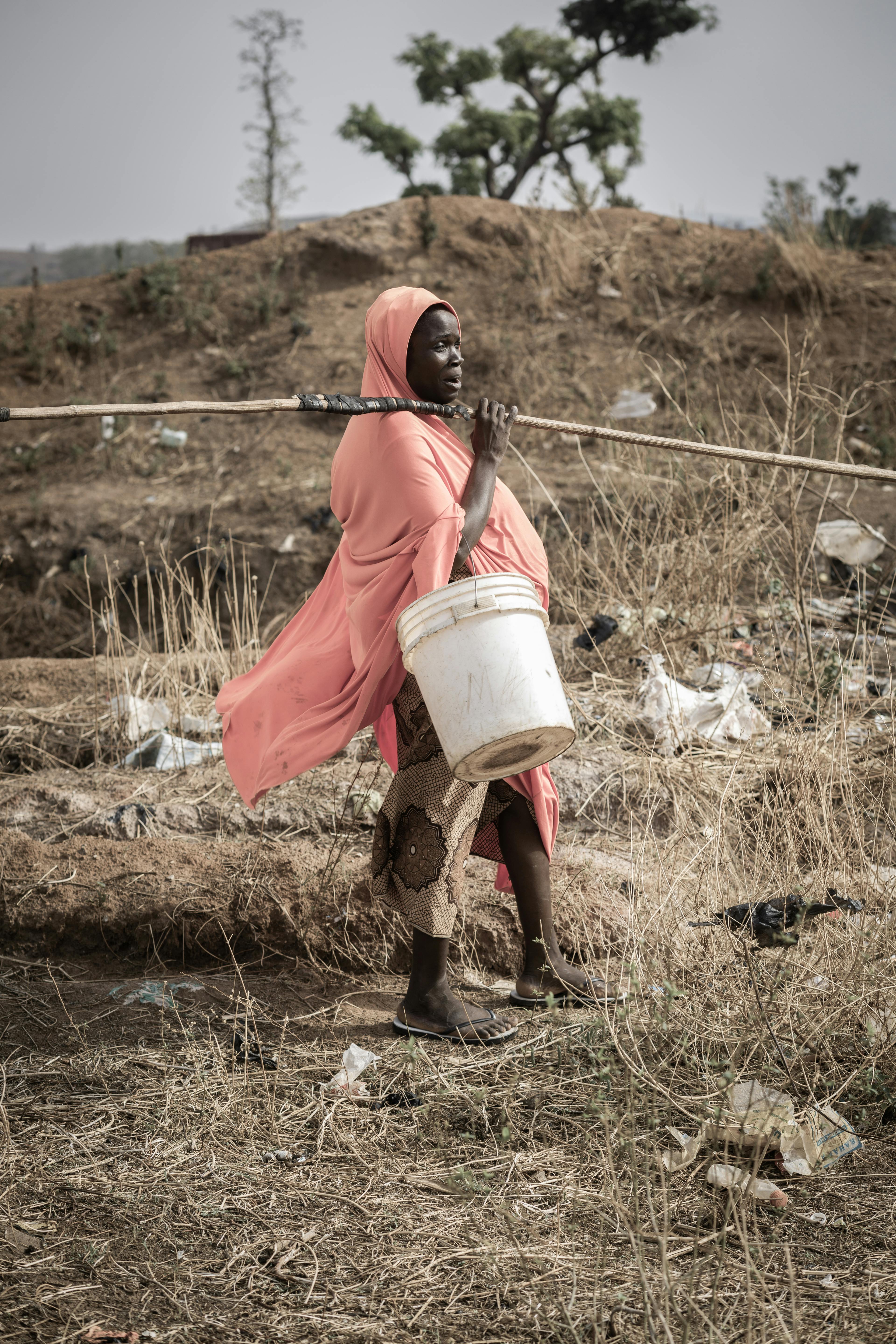 African Women Carrying Water Jerricans Photos, Download The BEST Free ...