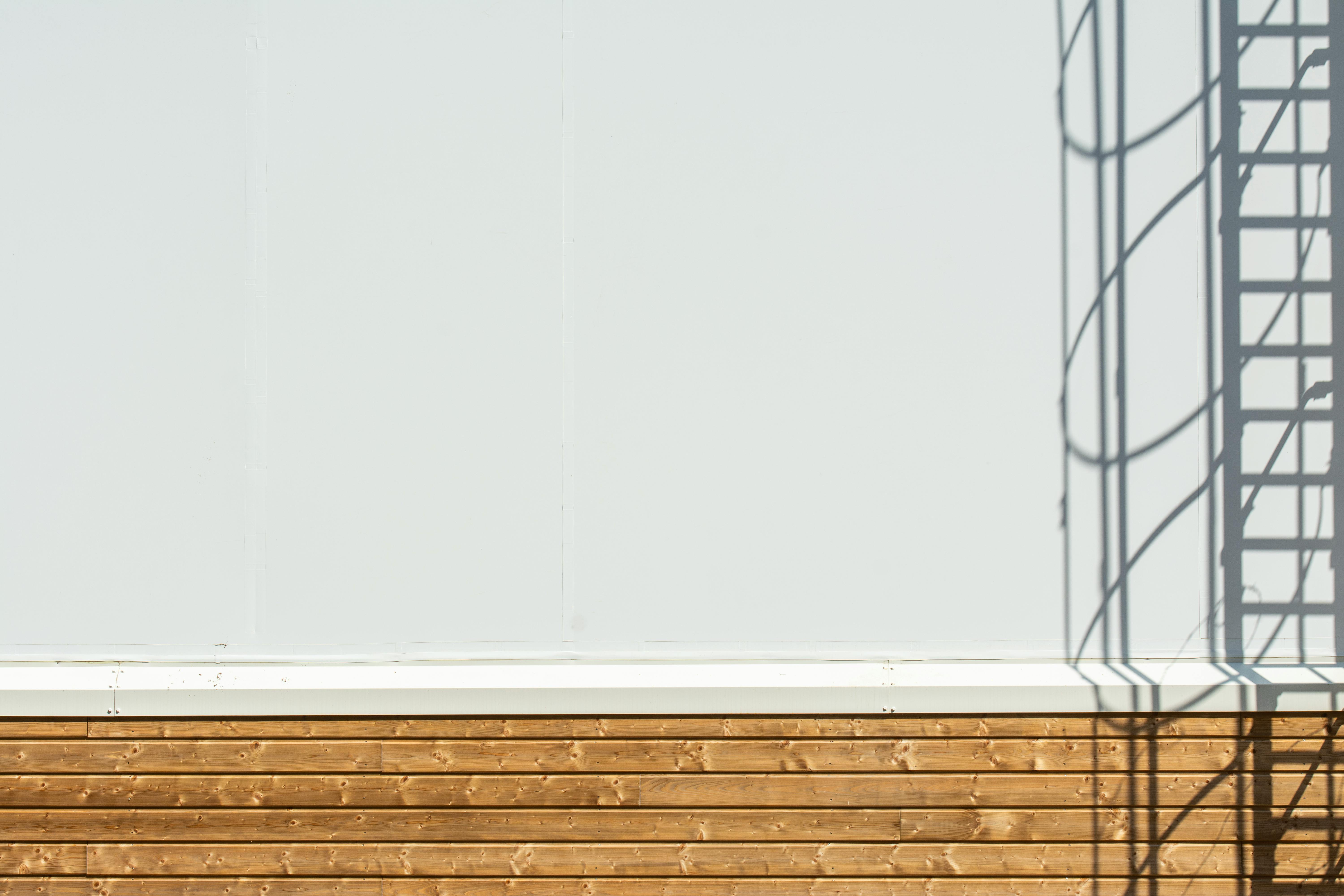 Ladder Shadow on Building Wall · Free Stock Photo