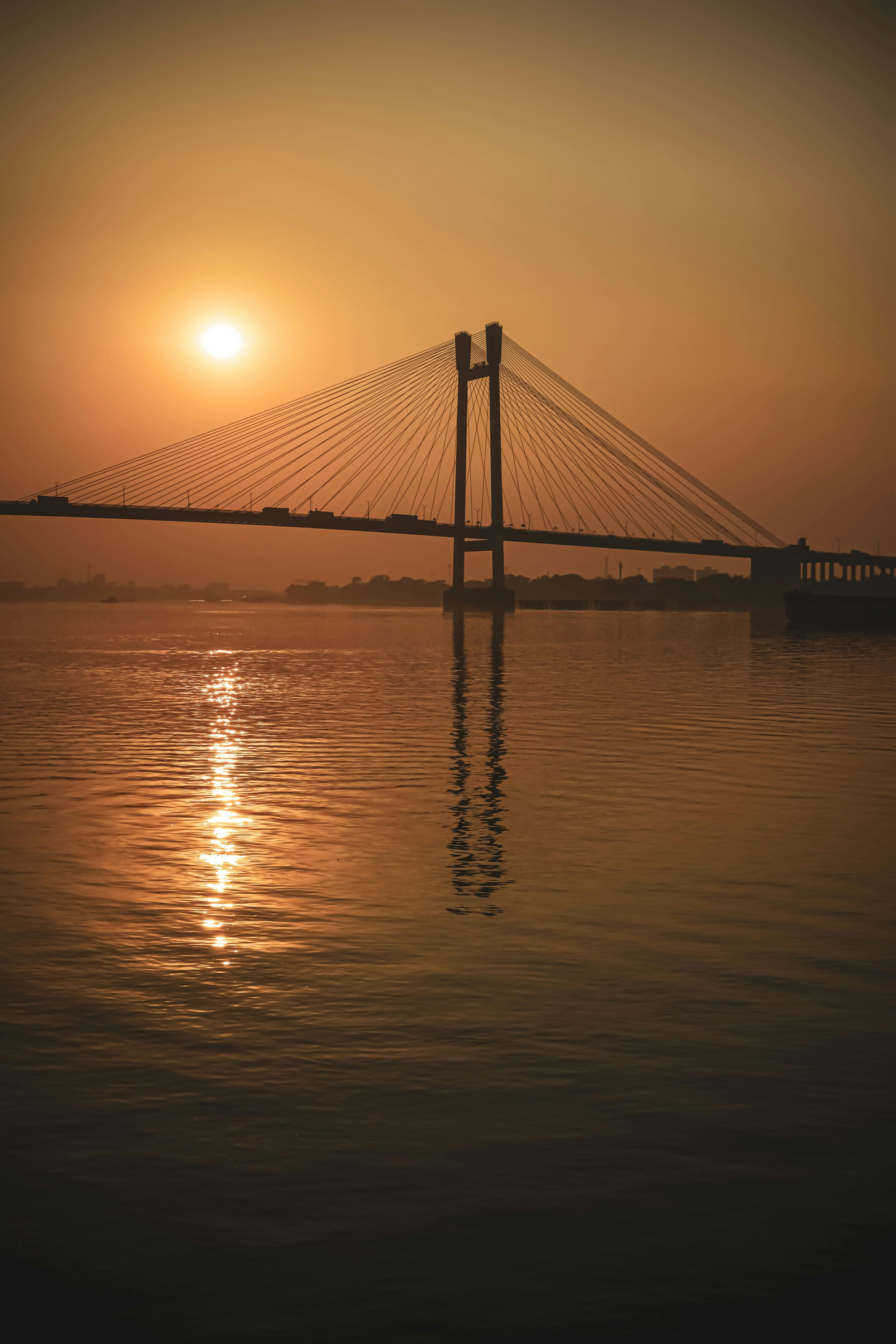 Bridge on Sea Coast at Sunset · Free Stock Photo