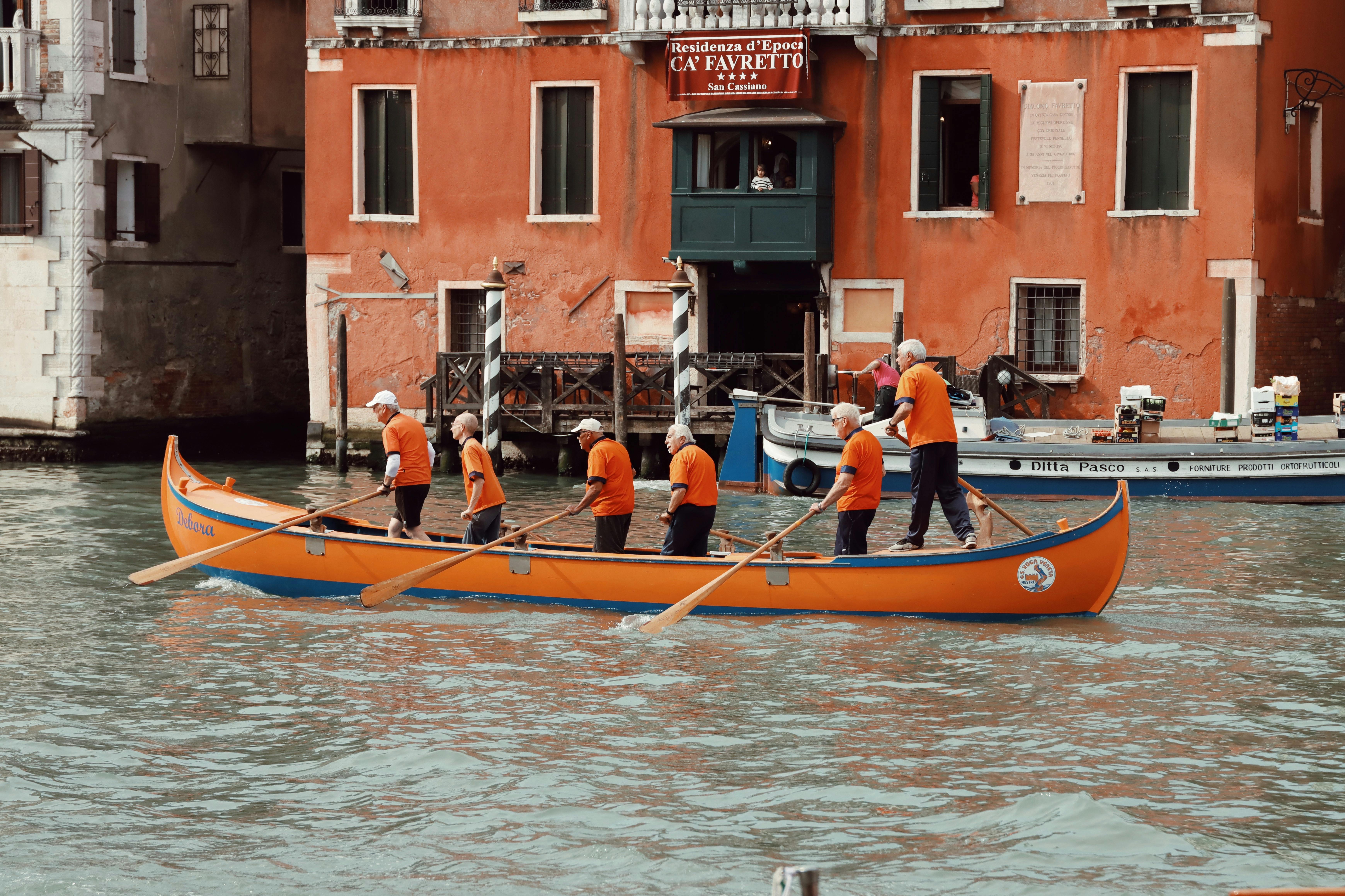 Elderly Men Rowing on Gondola in Venice · Free Stock Photo
