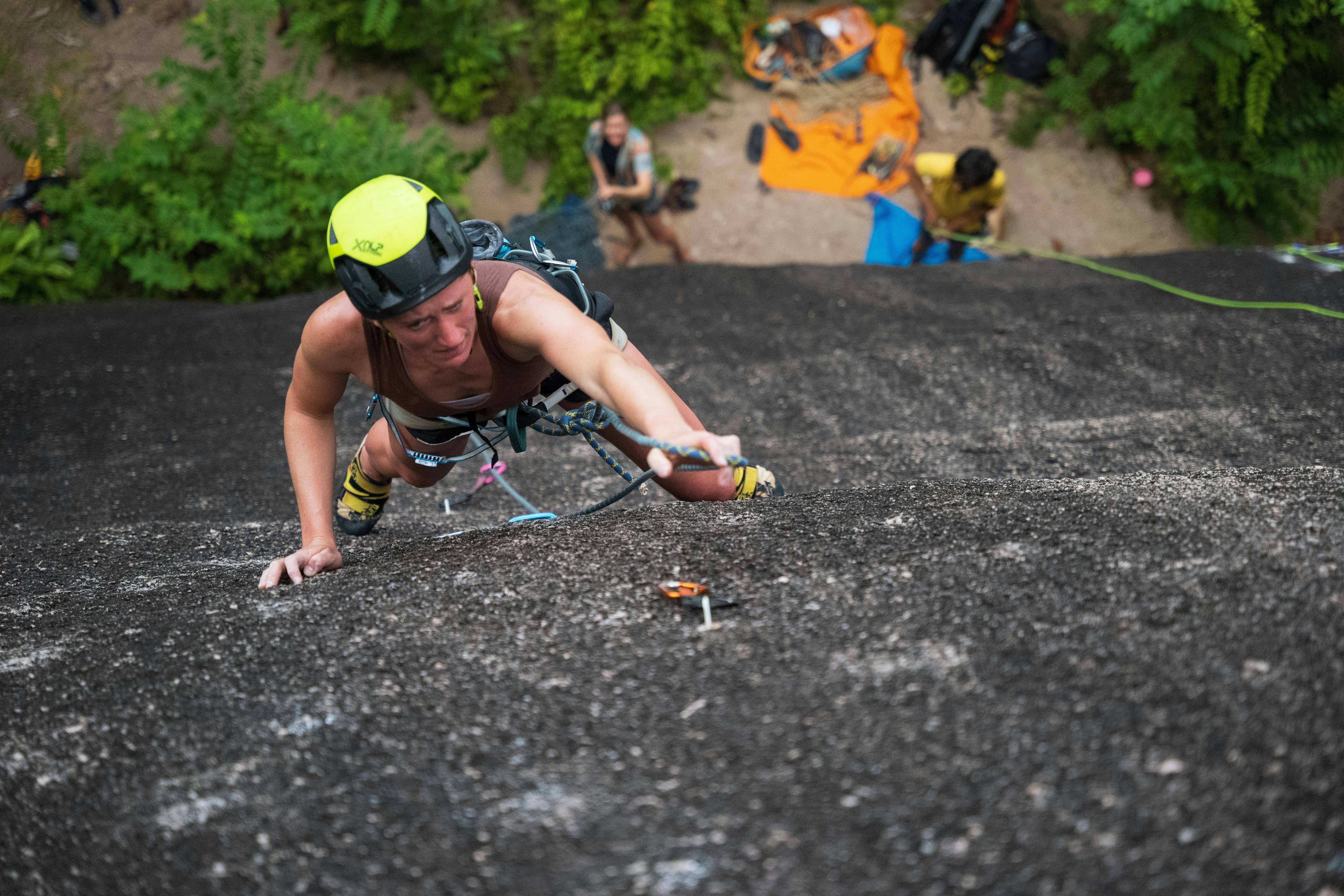 Person Climbing on Rock Mountain · Free Stock Photo