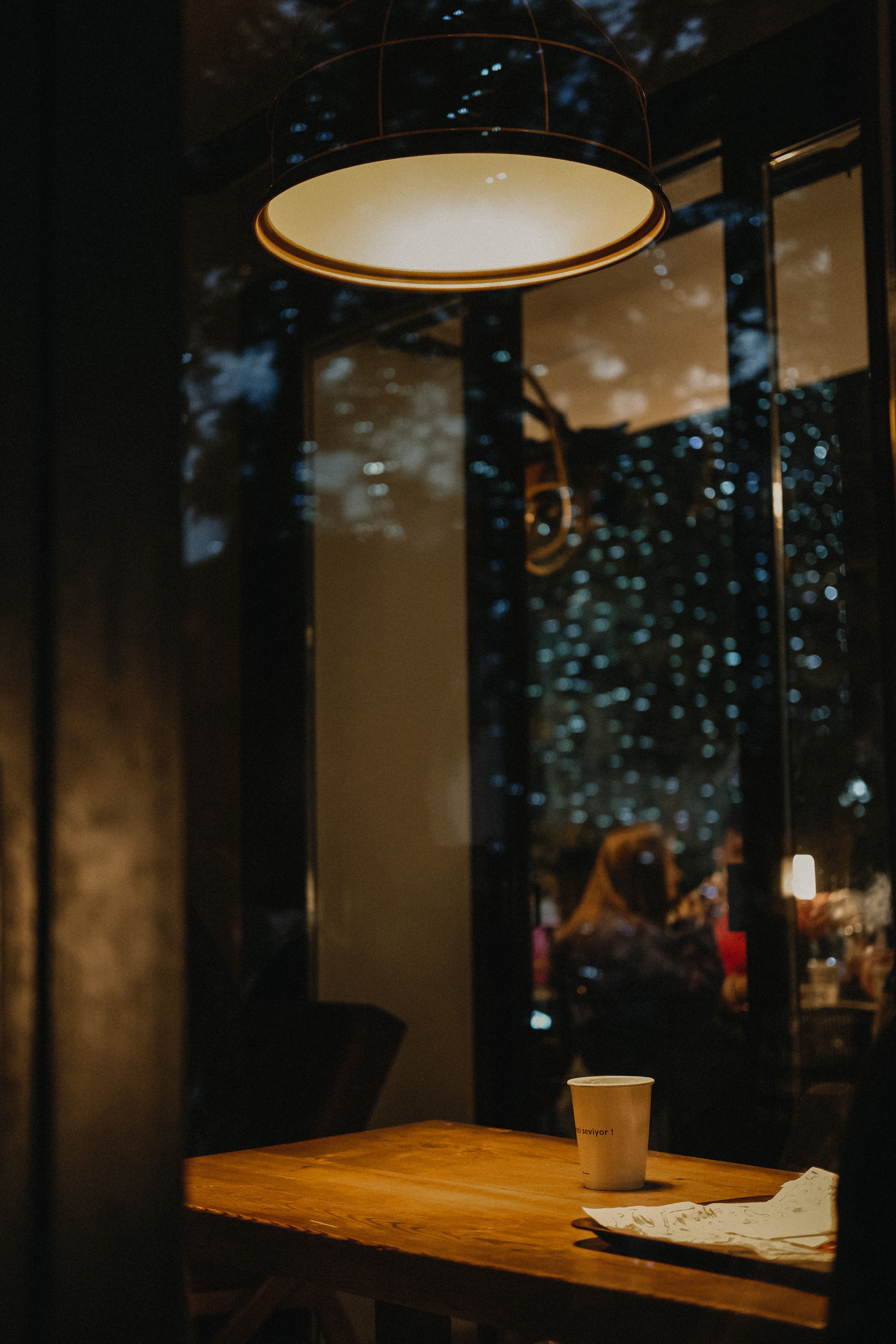Light Fixture Glowing over a Table · Free Stock Photo