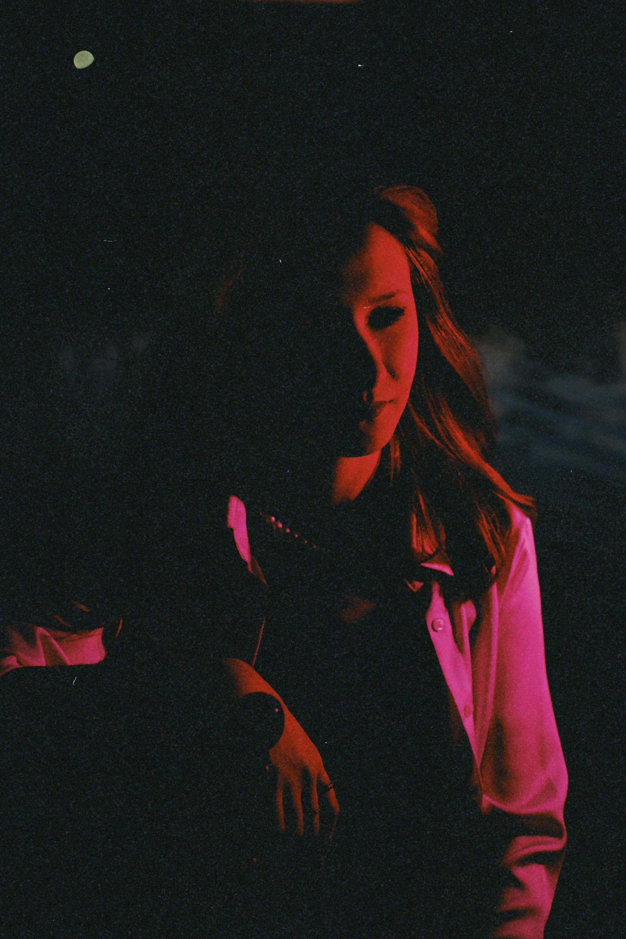 Red Light over Woman at Night · Free Stock Photo